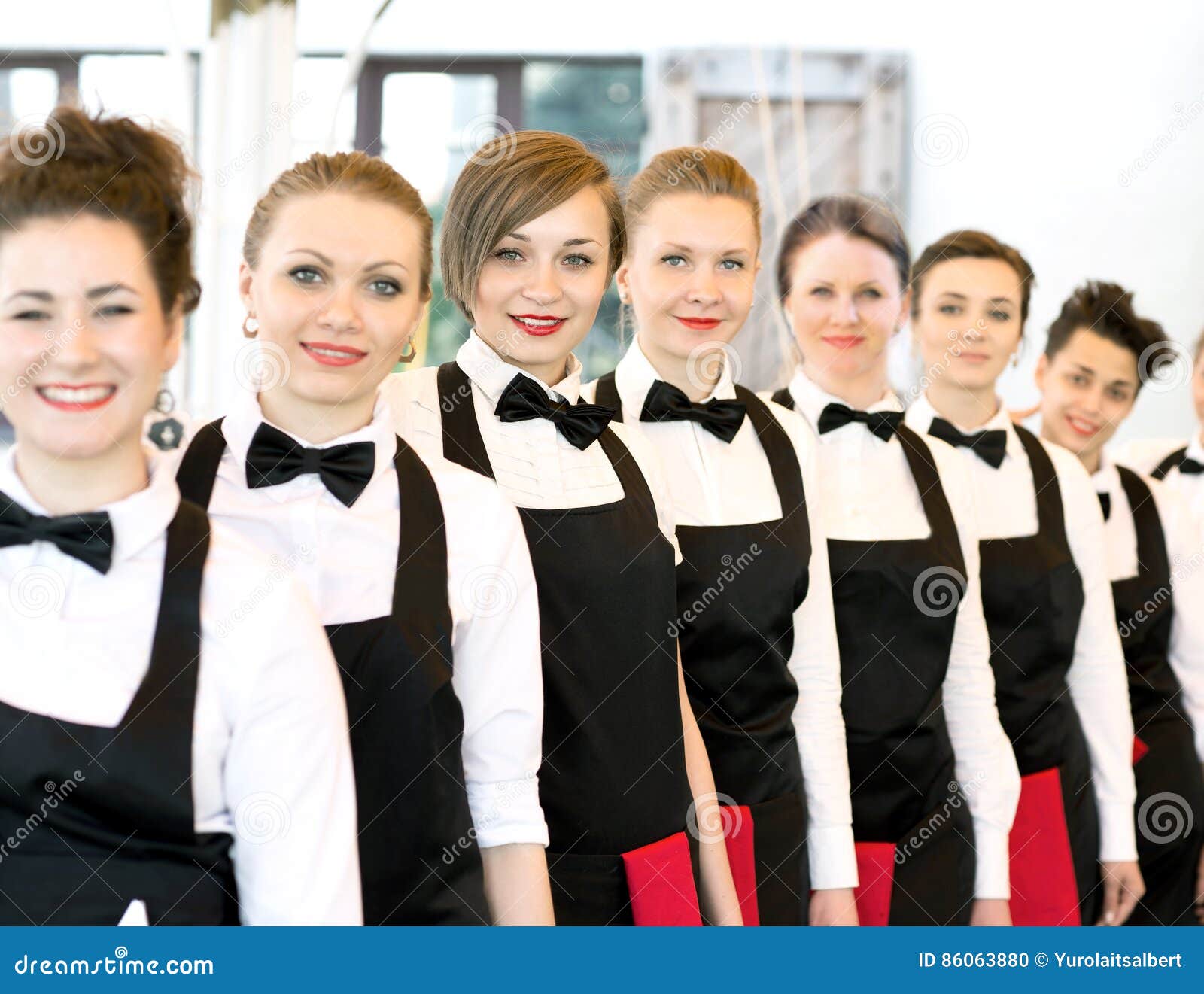 Group of Waiters at a Prestigious Restaurant Standing in the Col Stock ...