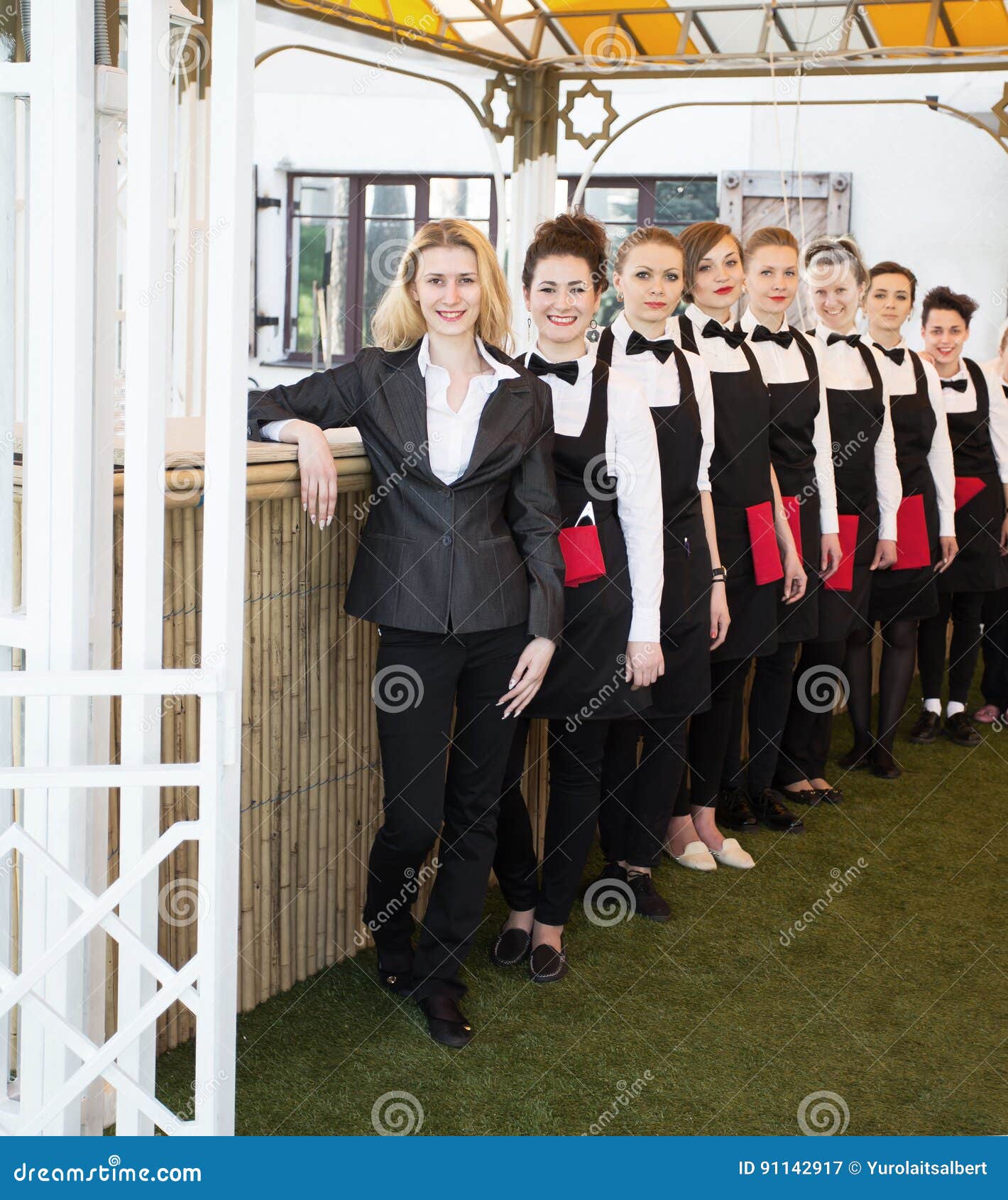 Group of Waiters at a Prestigious Restaurant Standing in the Col Stock ...