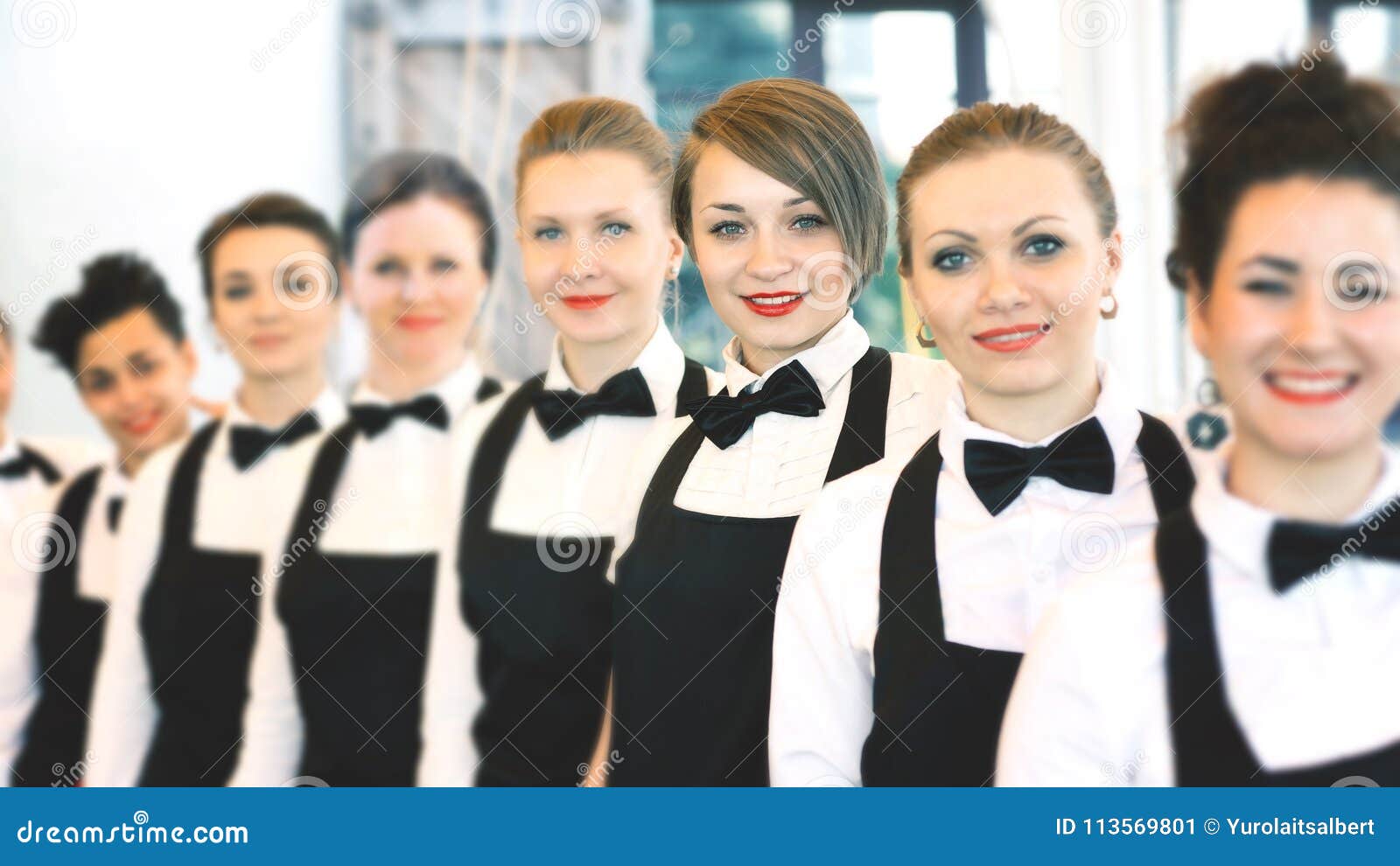 Group of Waiters at a Prestigious Restaurant Standing in the Col Stock ...