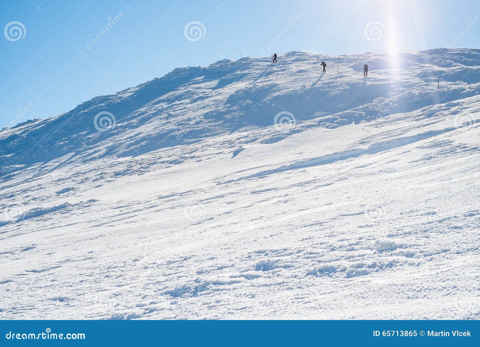 Group Walking on Snowy Mountains Stock Image - Image of happiness, alps ...