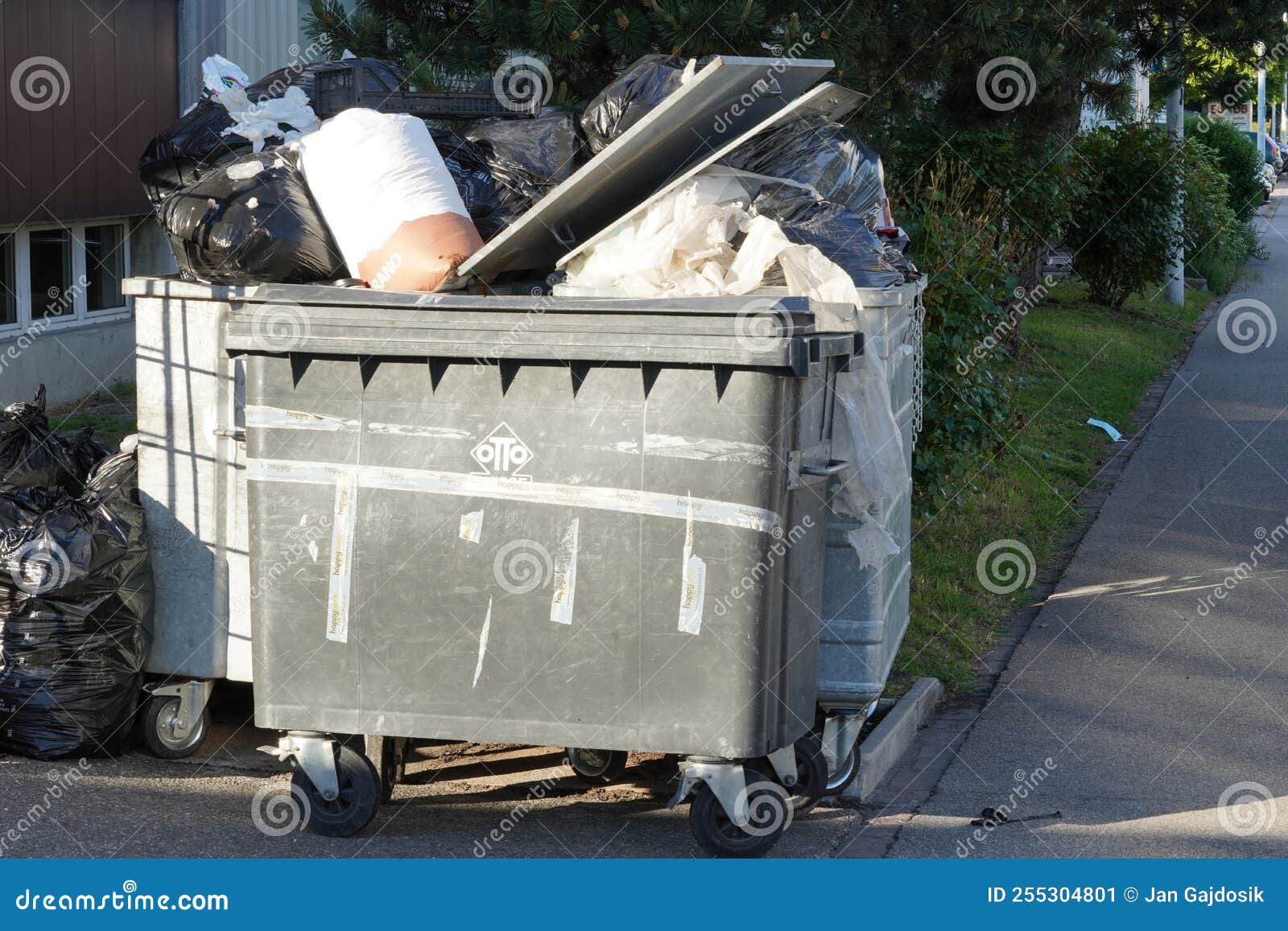 A Group of Waste Containers on Wheels. Stock Image - Image of garbage ...
