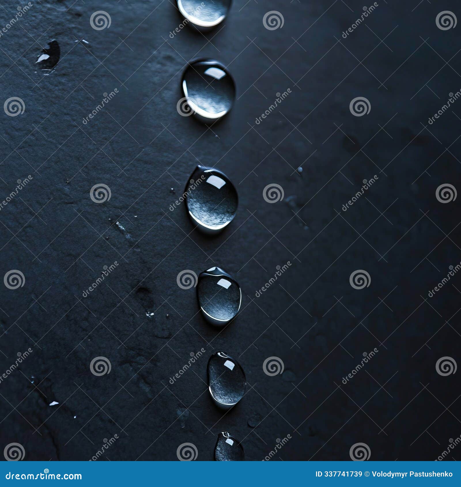 A Group of Water Droplets on a Black Surface Stock Image - Image of ...