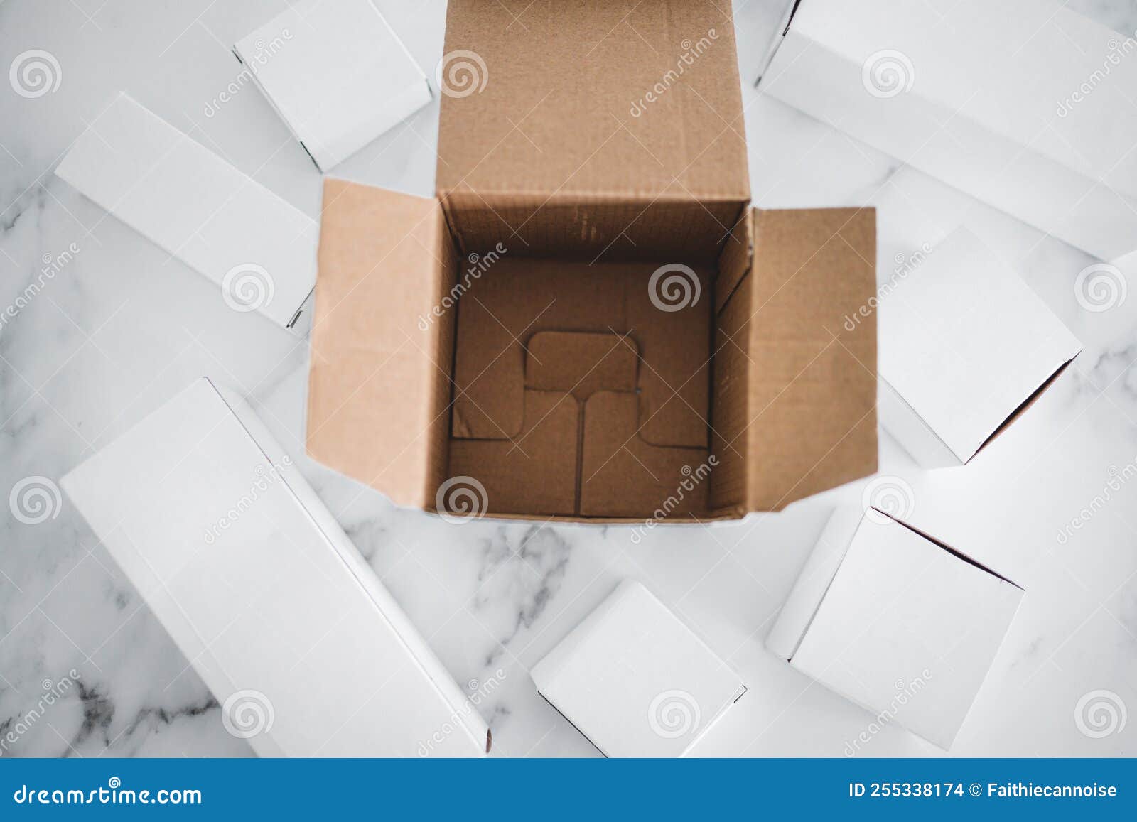 Group of White Plain Delivery Parcels with an Open and Empty One in the ...