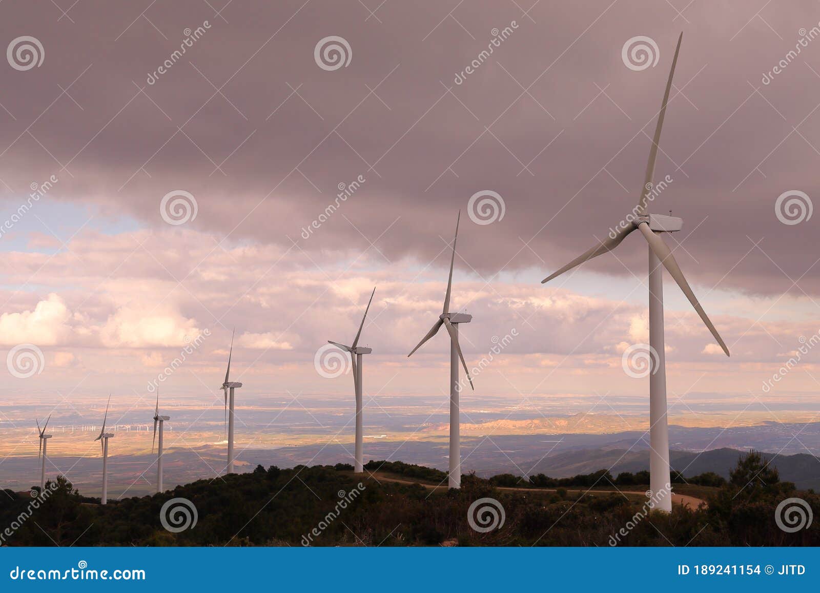 WIND FARM of WIND GENERATORS at the TOP of a MOUNTAIN Stock Photo ...
