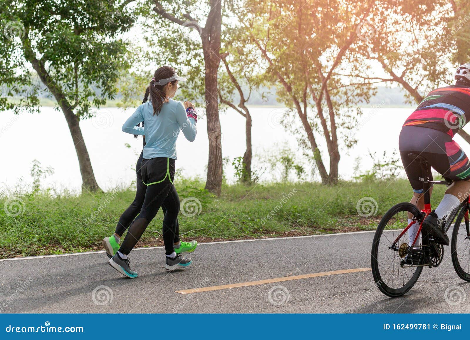 Group of Woman Exercise Running on Park Trail in the Morning. Editorial ...