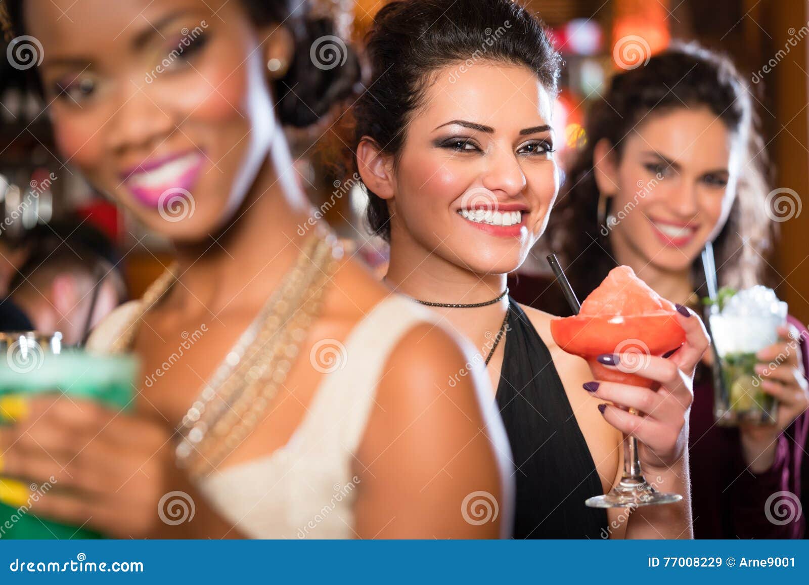 Group of Women Drinking Cocktails in Bar Stock Image - Image of group ...