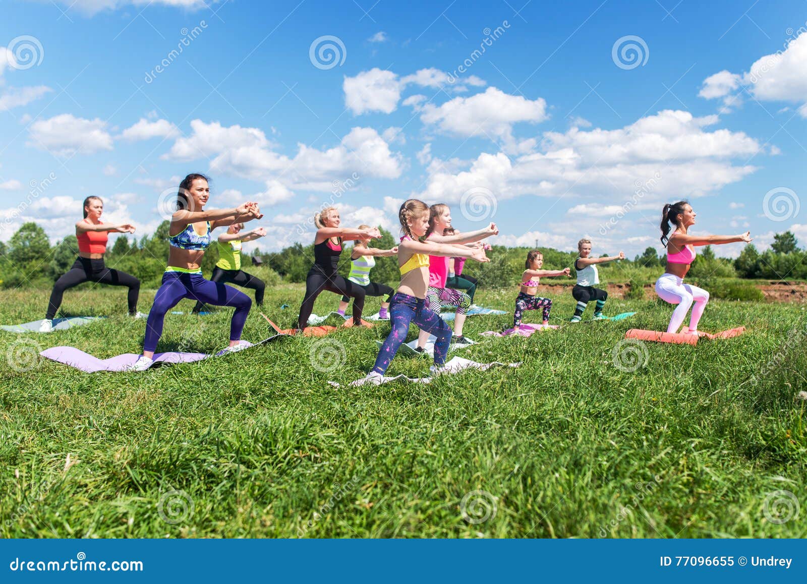 Group of Women Exercising and Doing Squats at Boot Camp. Stock Image ...