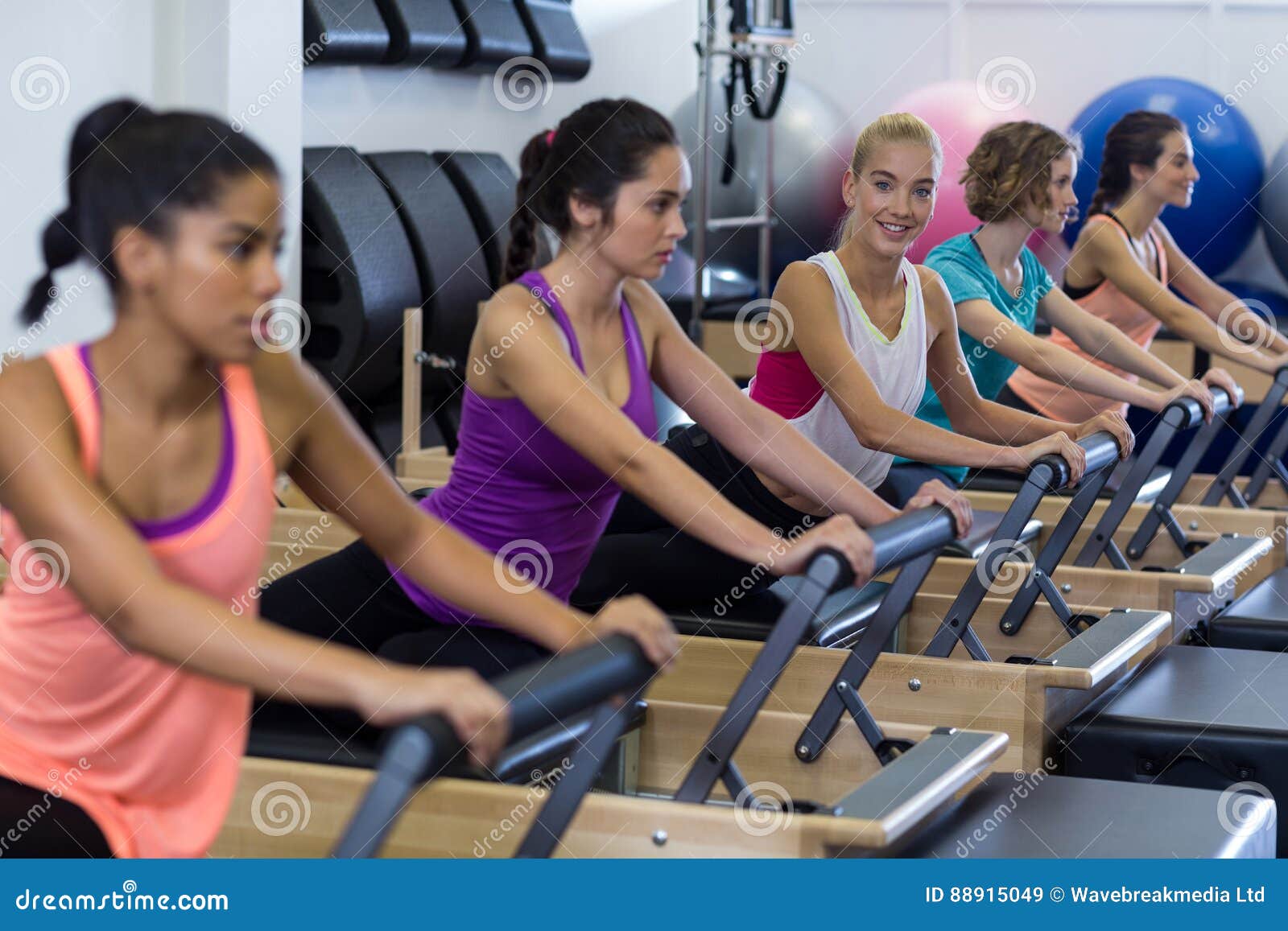Group of Women Exercising on Reformer Stock Image - Image of active ...