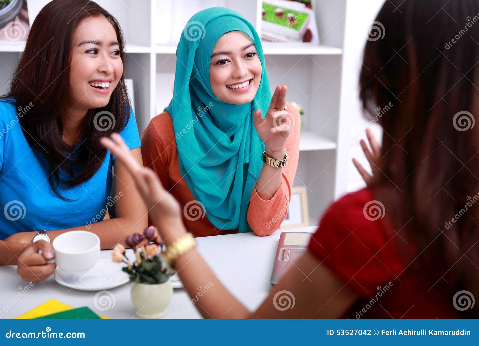 A Group of Women Have an Interesting Conversation Stock Photo - Image ...