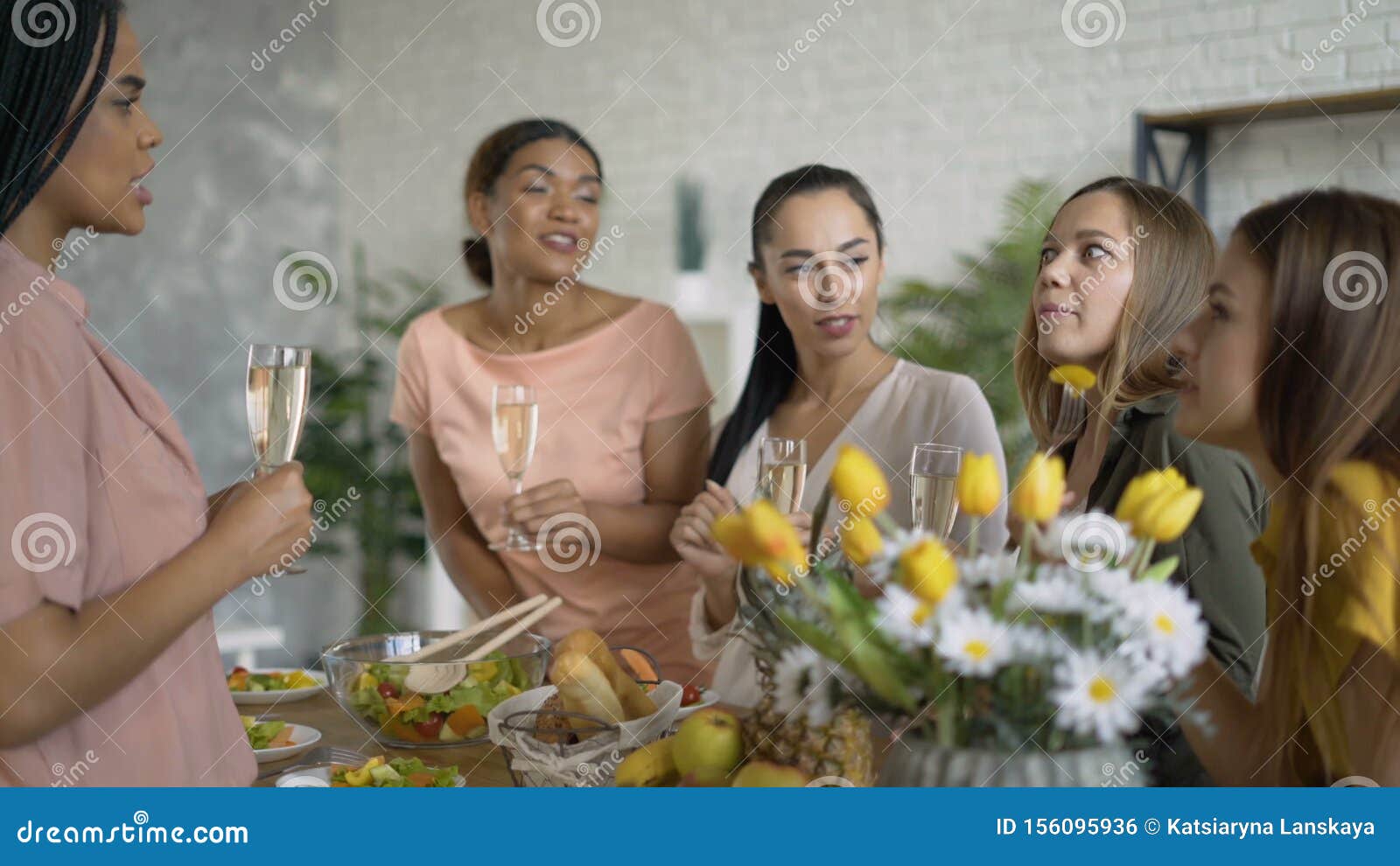 A Group of 5 Women of Mixed Race. Women Laughing and Talking on Brunch ...