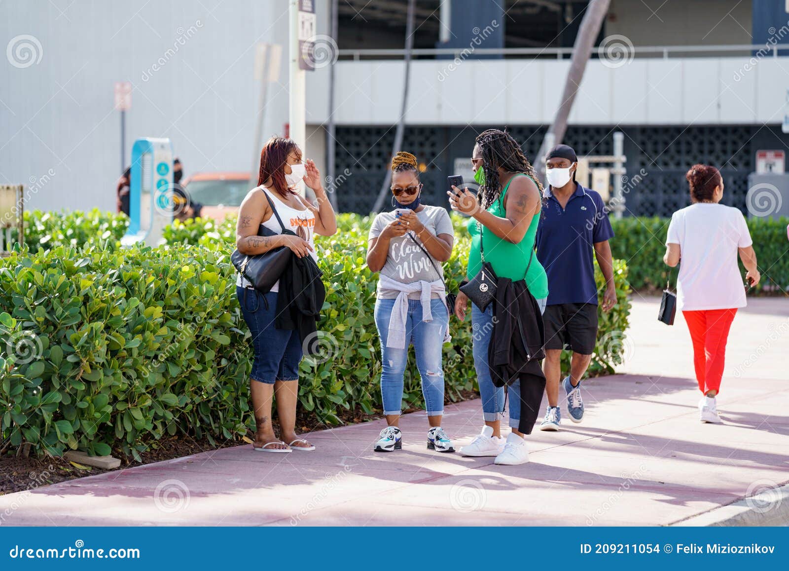 Group of Women Ordering a Lyft Uber Ride from Phone Editorial Stock ...