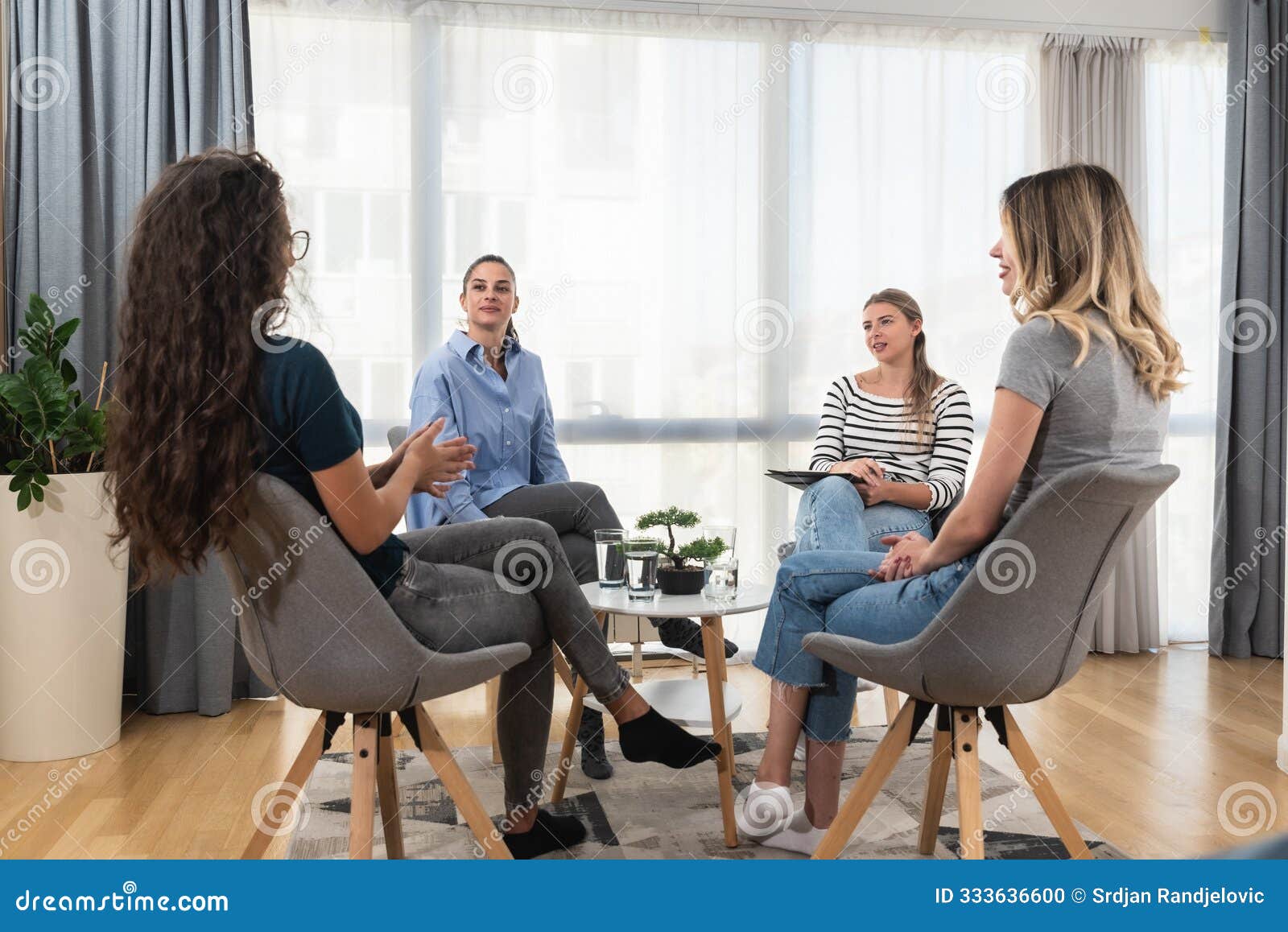 Group of Women Sitting and Talking, Discussing Work and Success ...