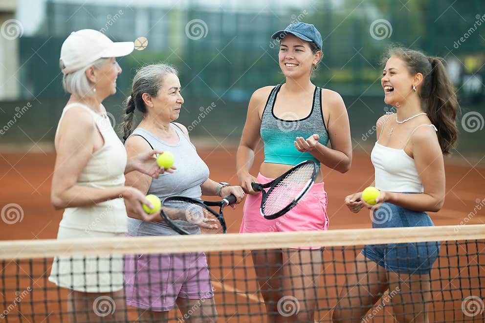 Group Of Women Talking On Tennis Court Stock Image Image Of Double