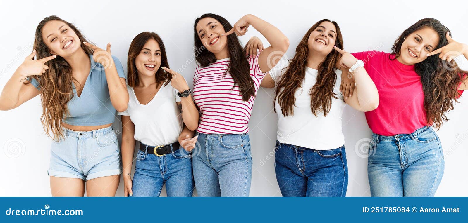 Group Of Women Wearing Casual Clothes Standing Over Isolated Background