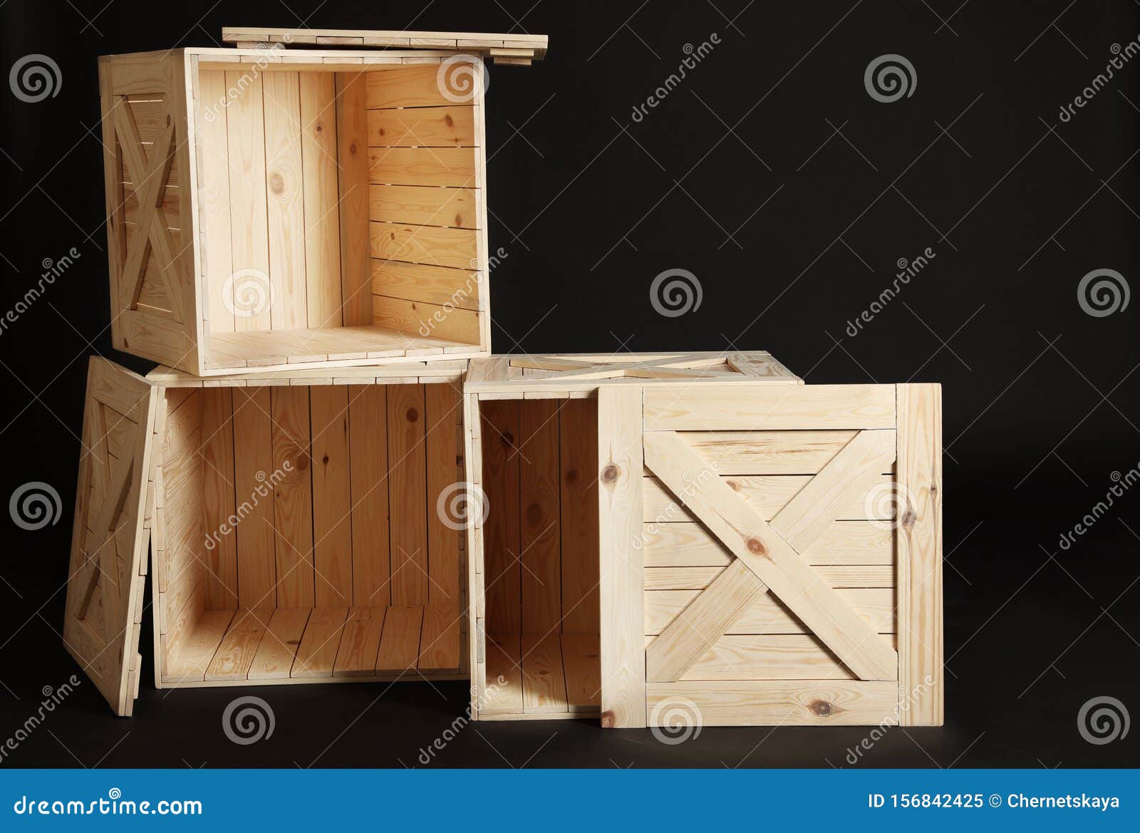 Group of Wooden Crates on Black Stock Image - Image of brown ...