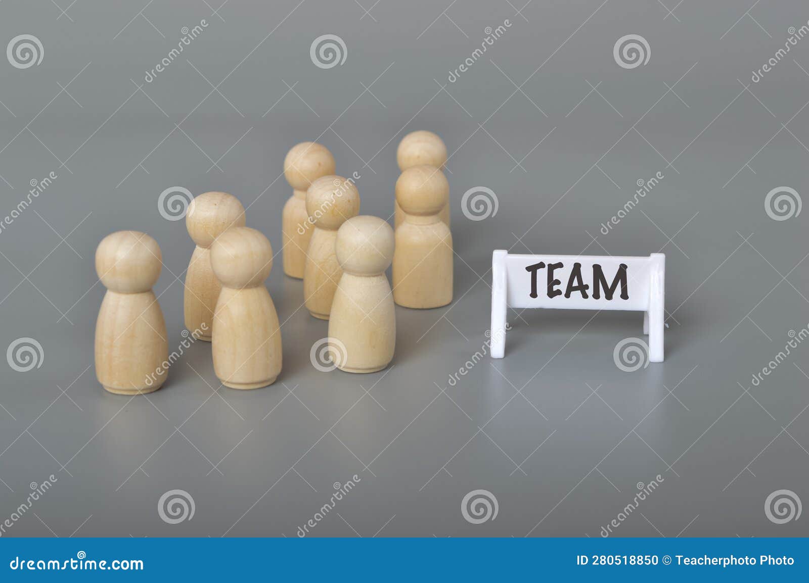 A Group of Wooden Figure with Text TEAM. Unity and Teamwork in ...
