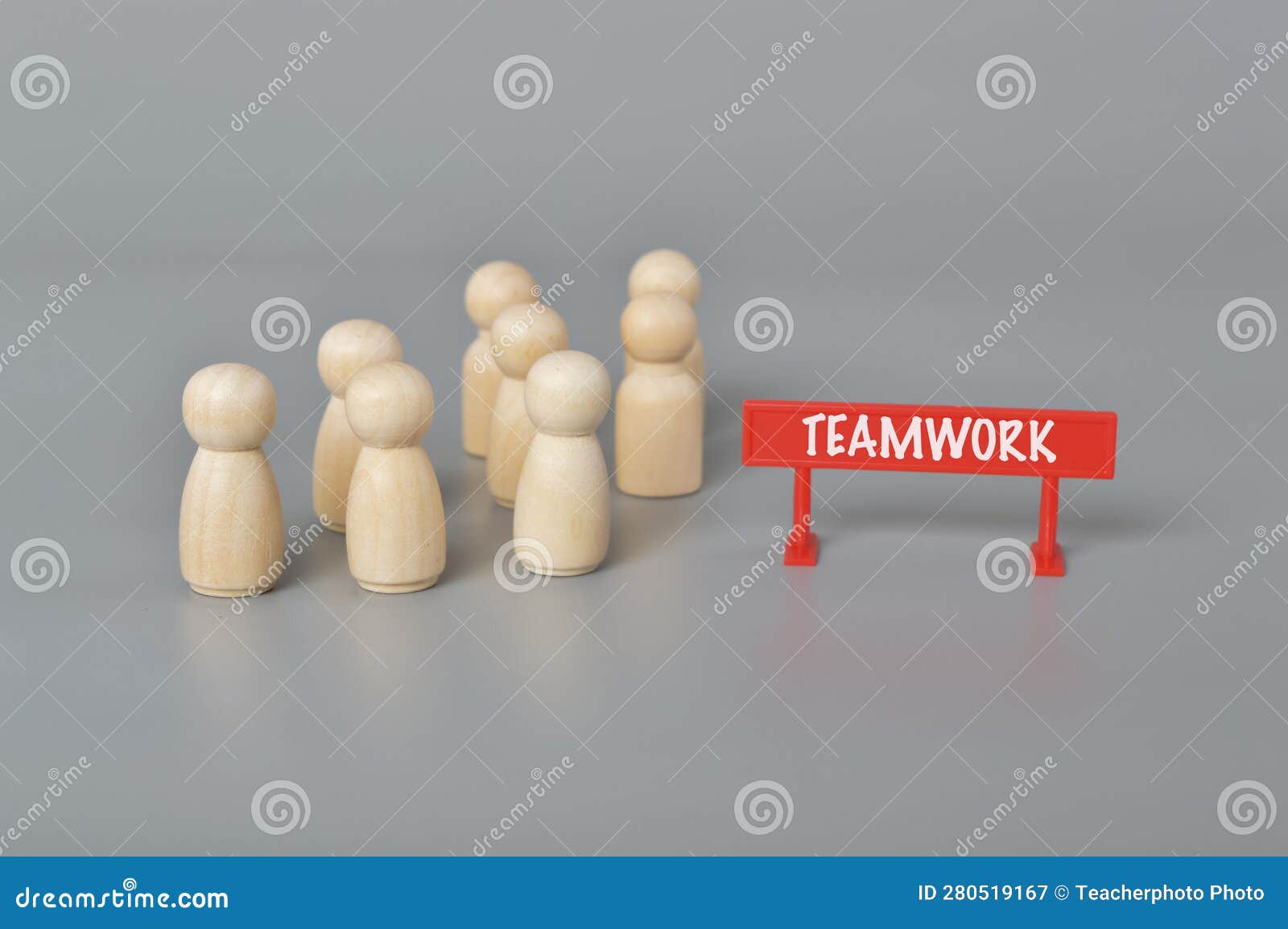A Group of Wooden Figure with Text TEAMWORK. Unity and Teamwork in ...