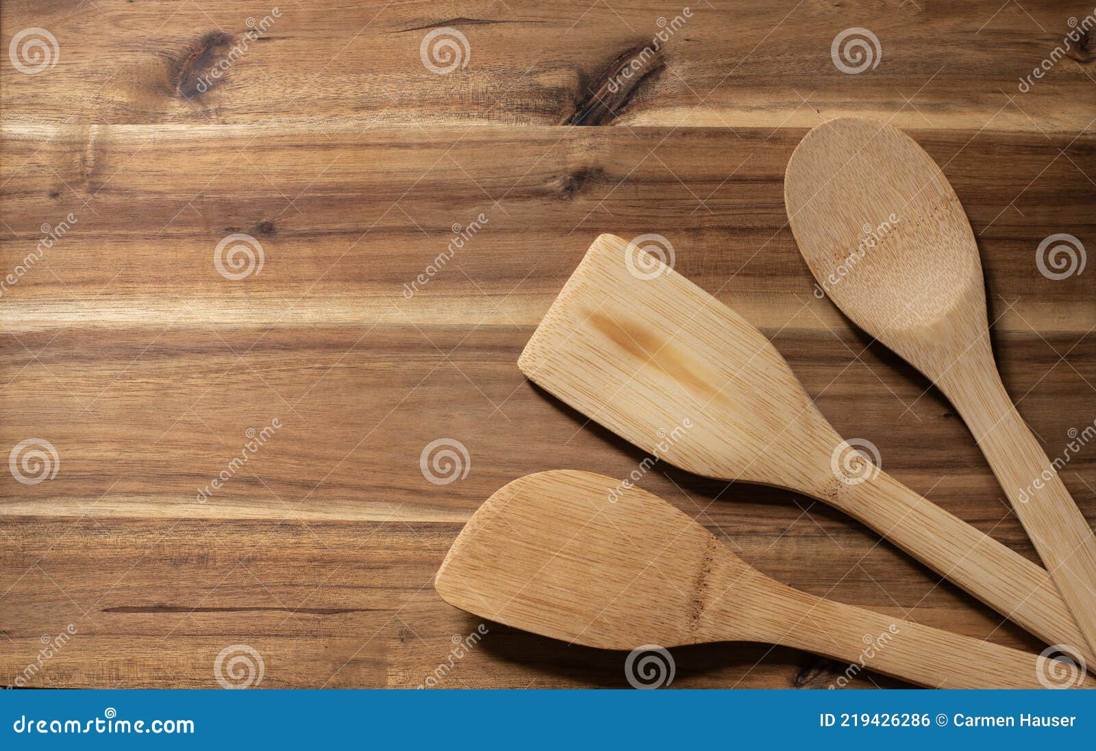 A Group of Wooden Spoons on a Cutting Board Stock Photo - Image of ...