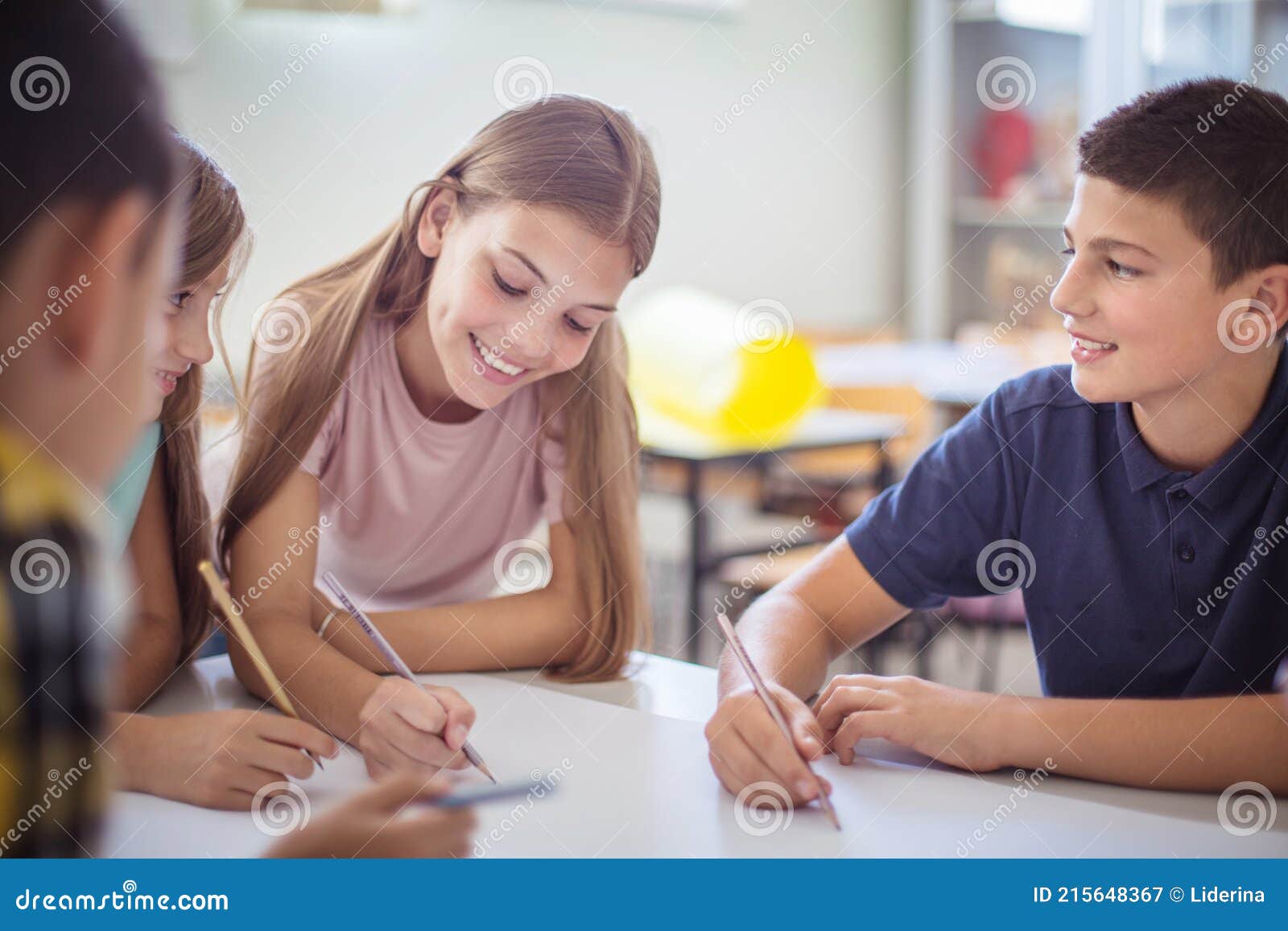Group work in class stock image. Image of cheerful, focus - 215648367