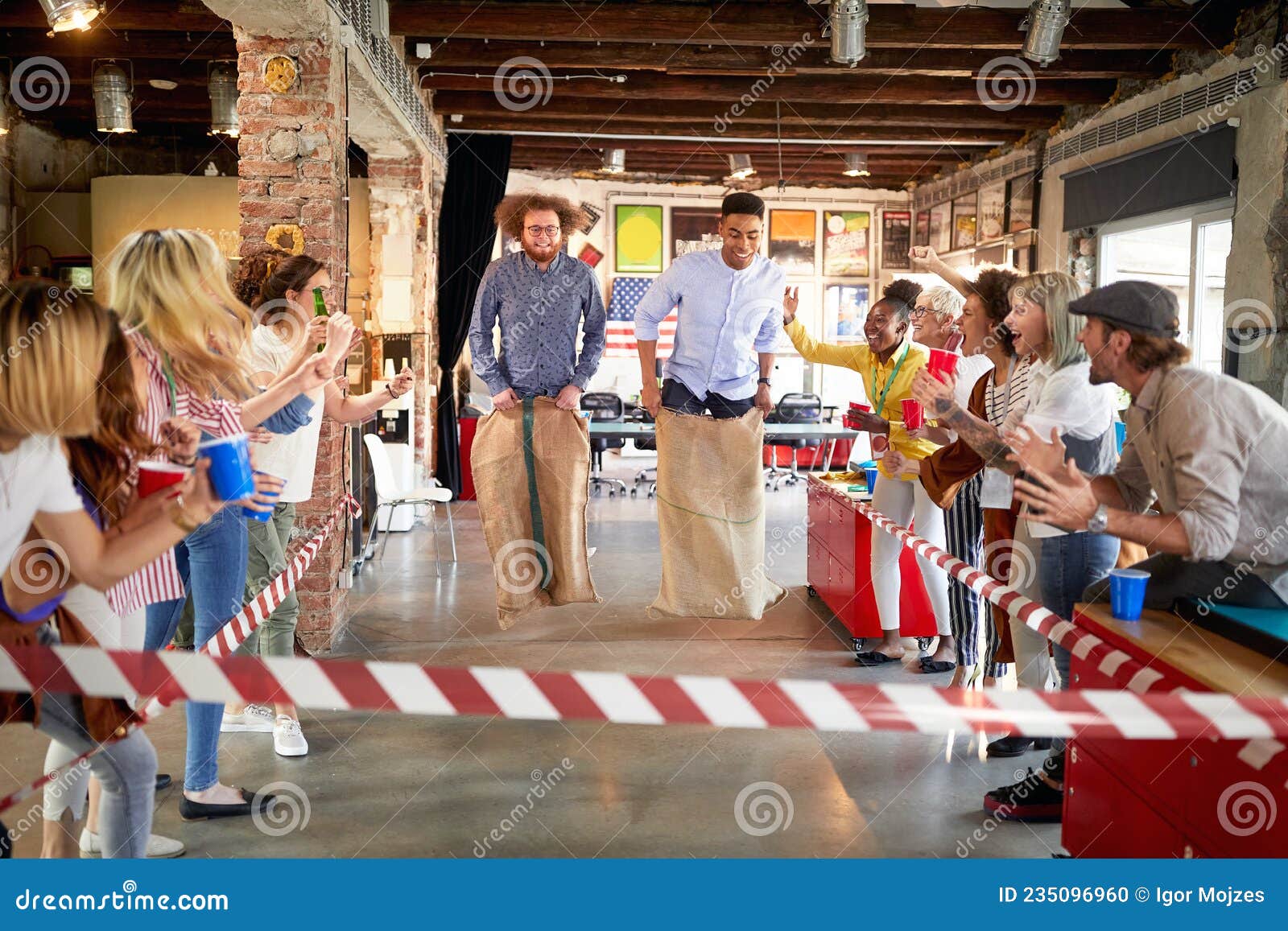 Group of Work Colleagues Having Fun Competition Together Stock Photo ...
