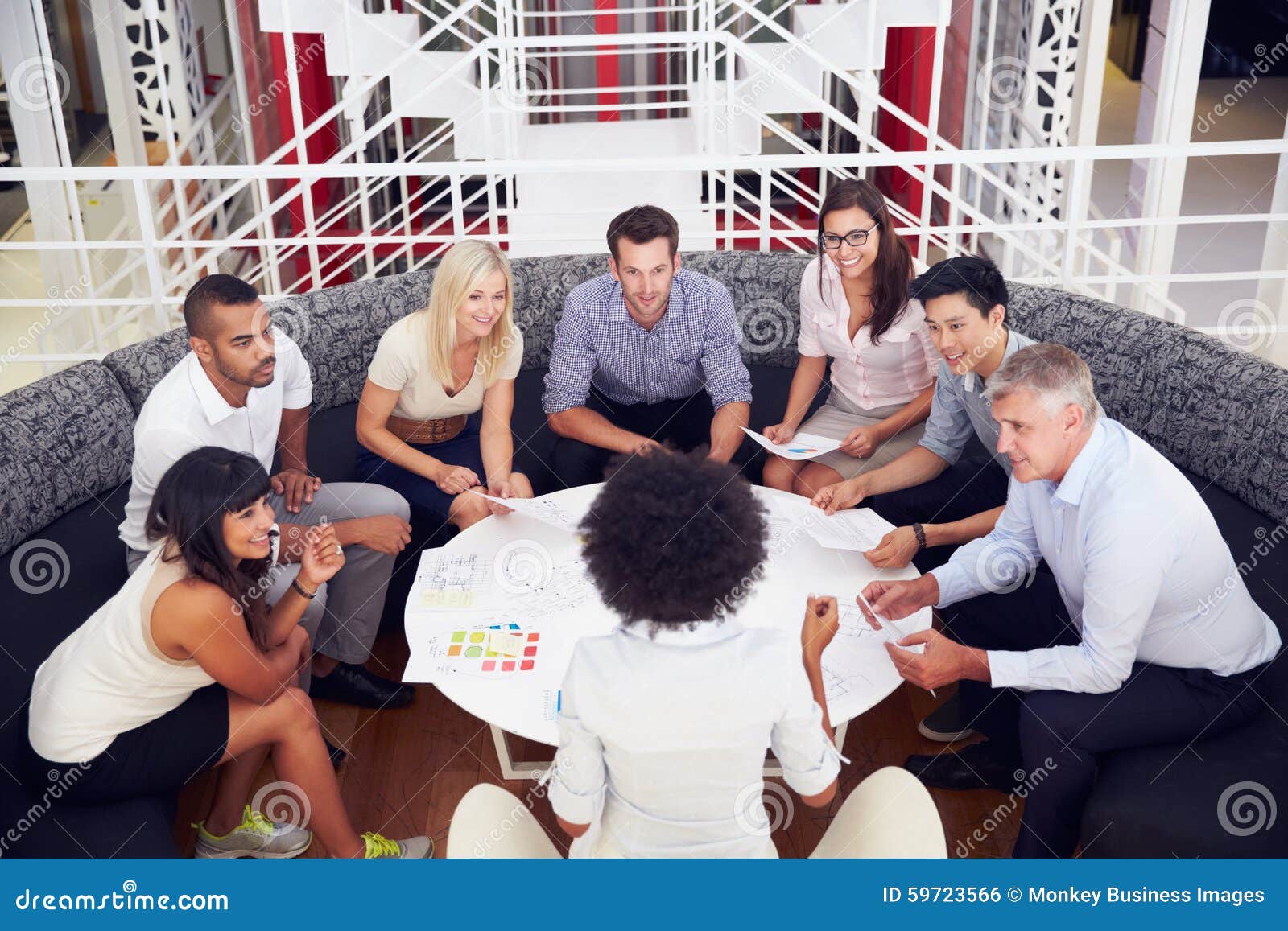 Group of Work Colleagues Having Meeting in an Office Lobby Stock Photo ...