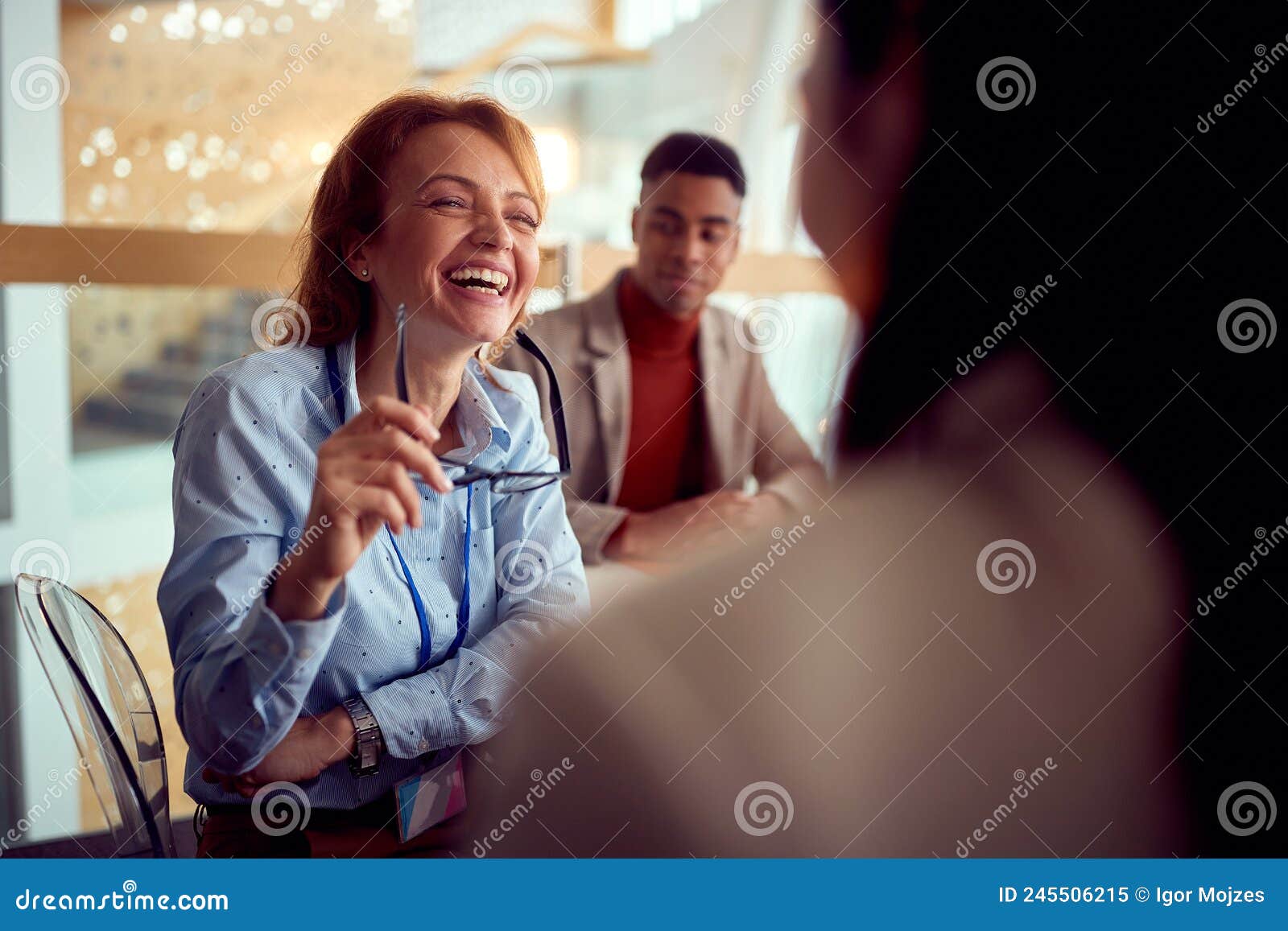 Group of Work Colleagues Socializing on a Break Stock Image - Image of ...