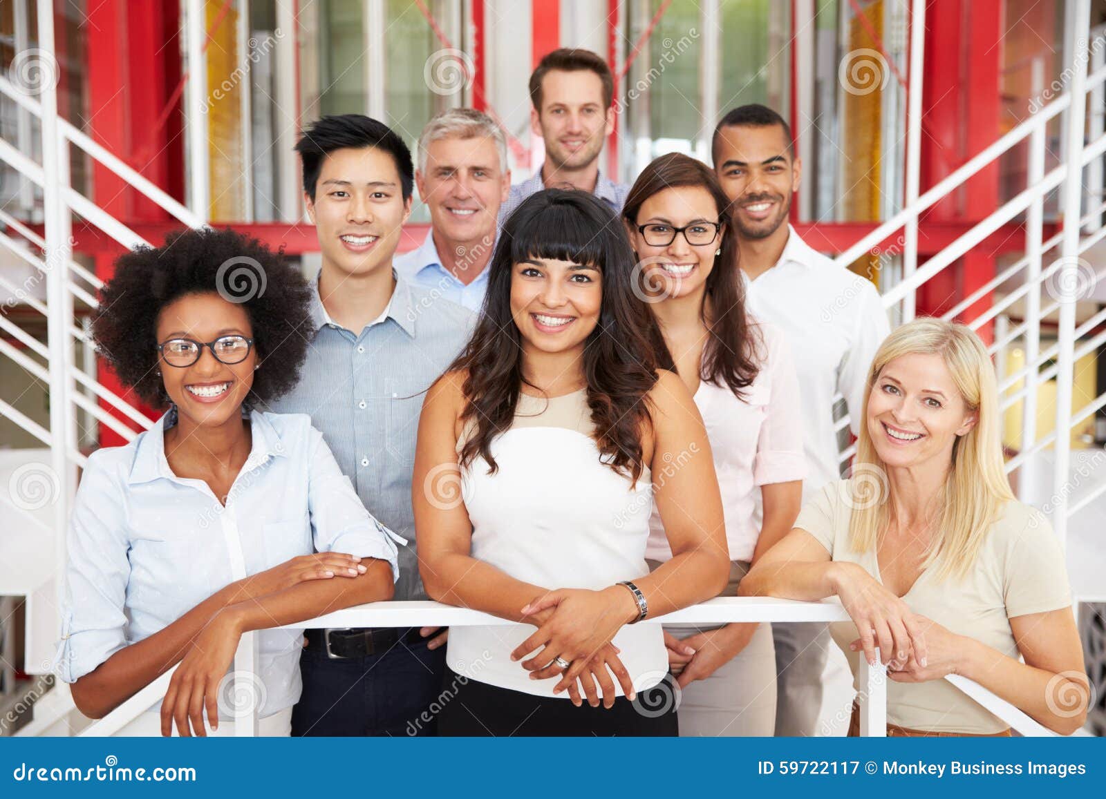 Group of Work Colleagues Standing in an Office Lobby Stock Image ...