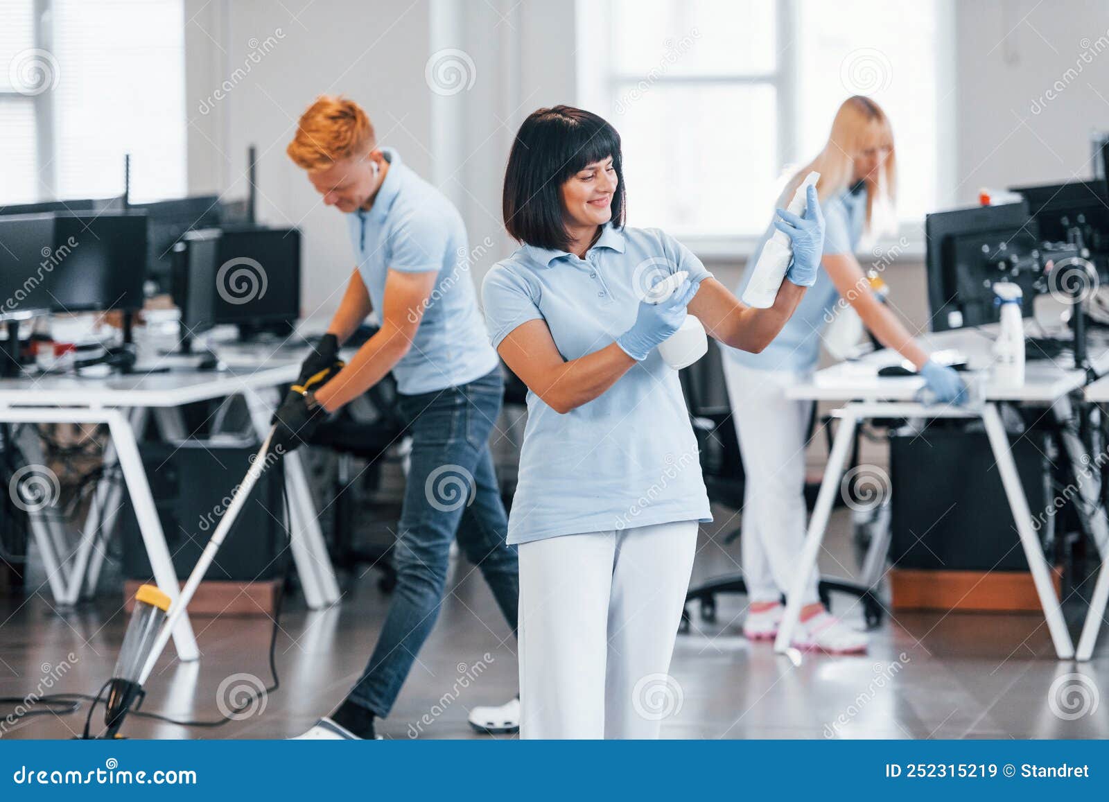 Group of Workers Clean Modern Office Together at Daytime Stock Image ...