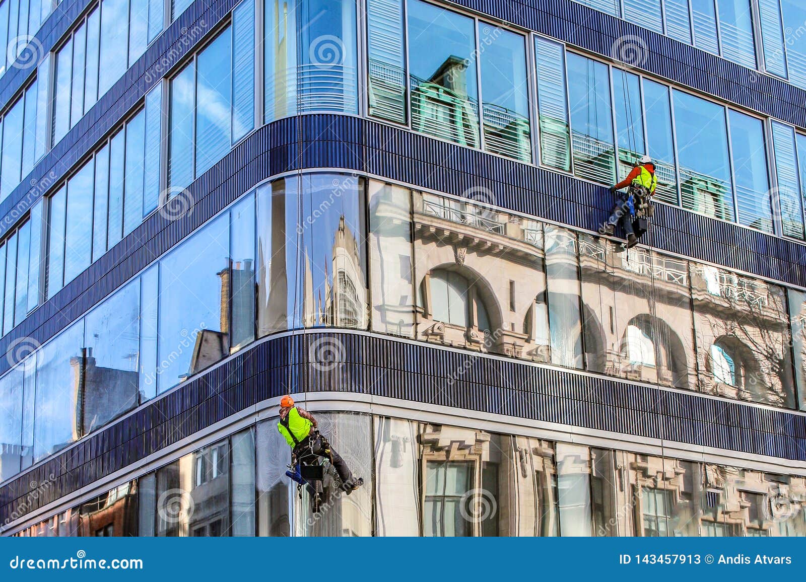 Group of Workers Cleaning Windows Service on High Rise Building ...