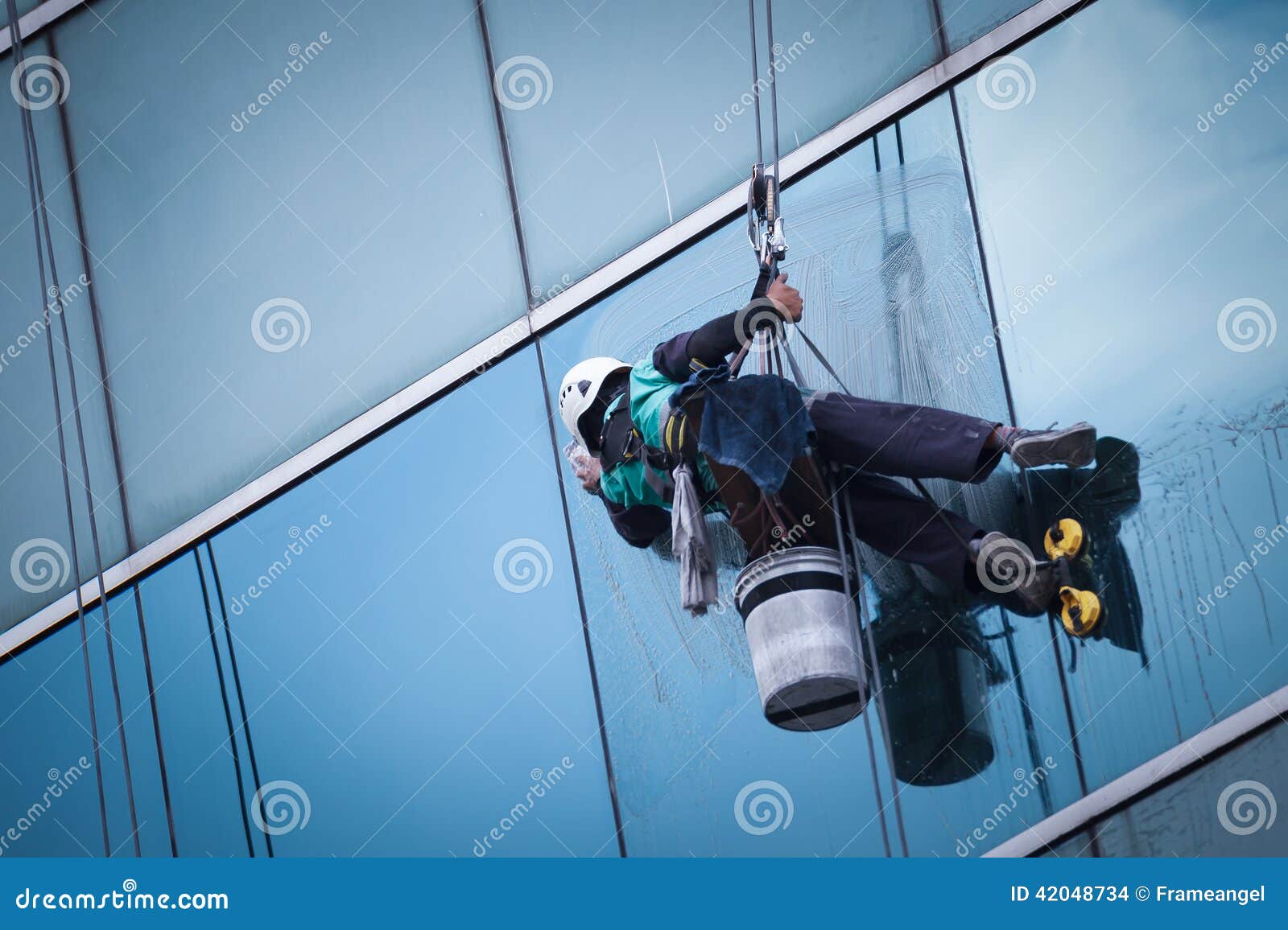 Group of Workers Cleaning Windows Service on High Rise Building Stock ...
