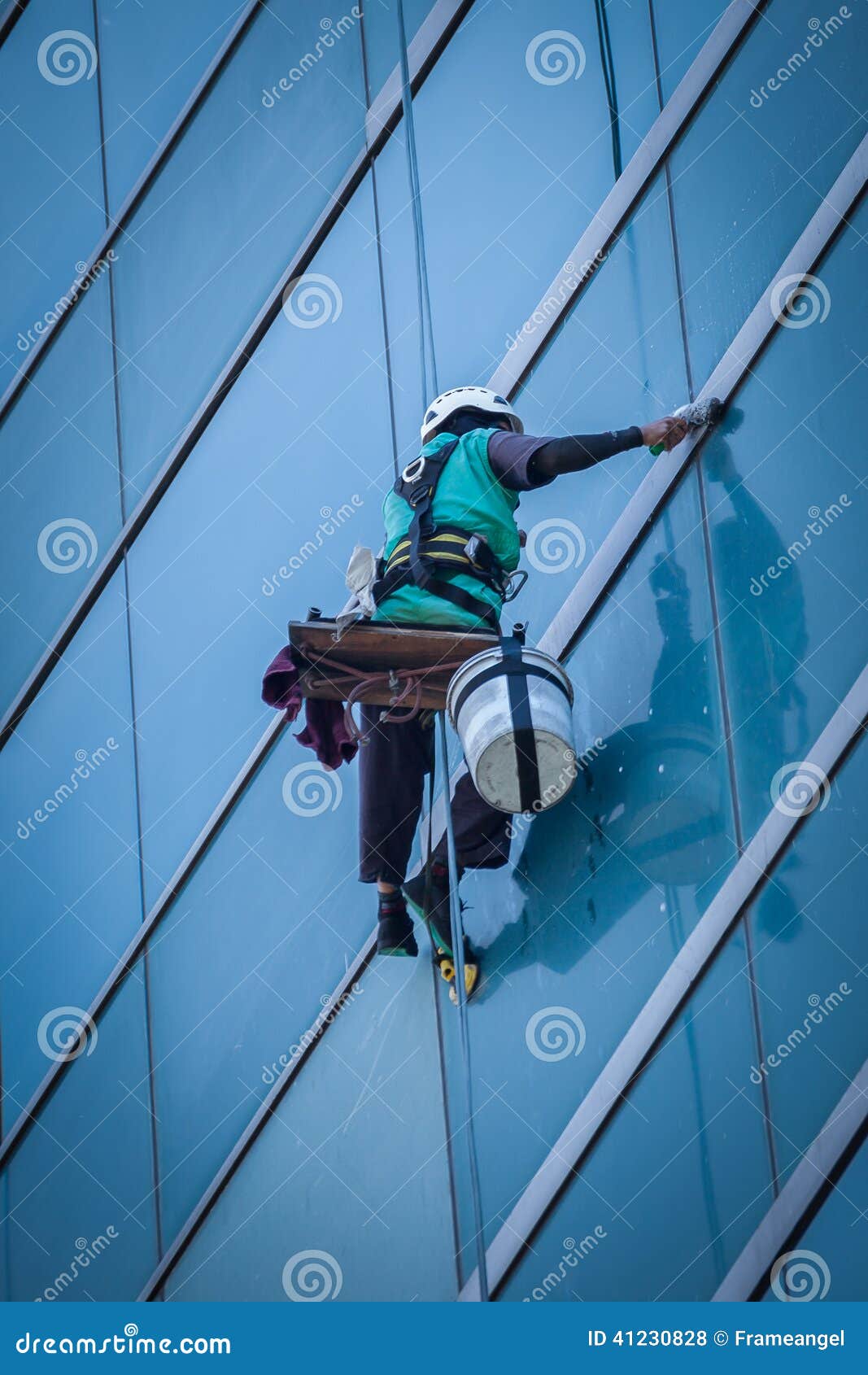 Group of Workers Cleaning Windows Service on High Rise Building Stock ...