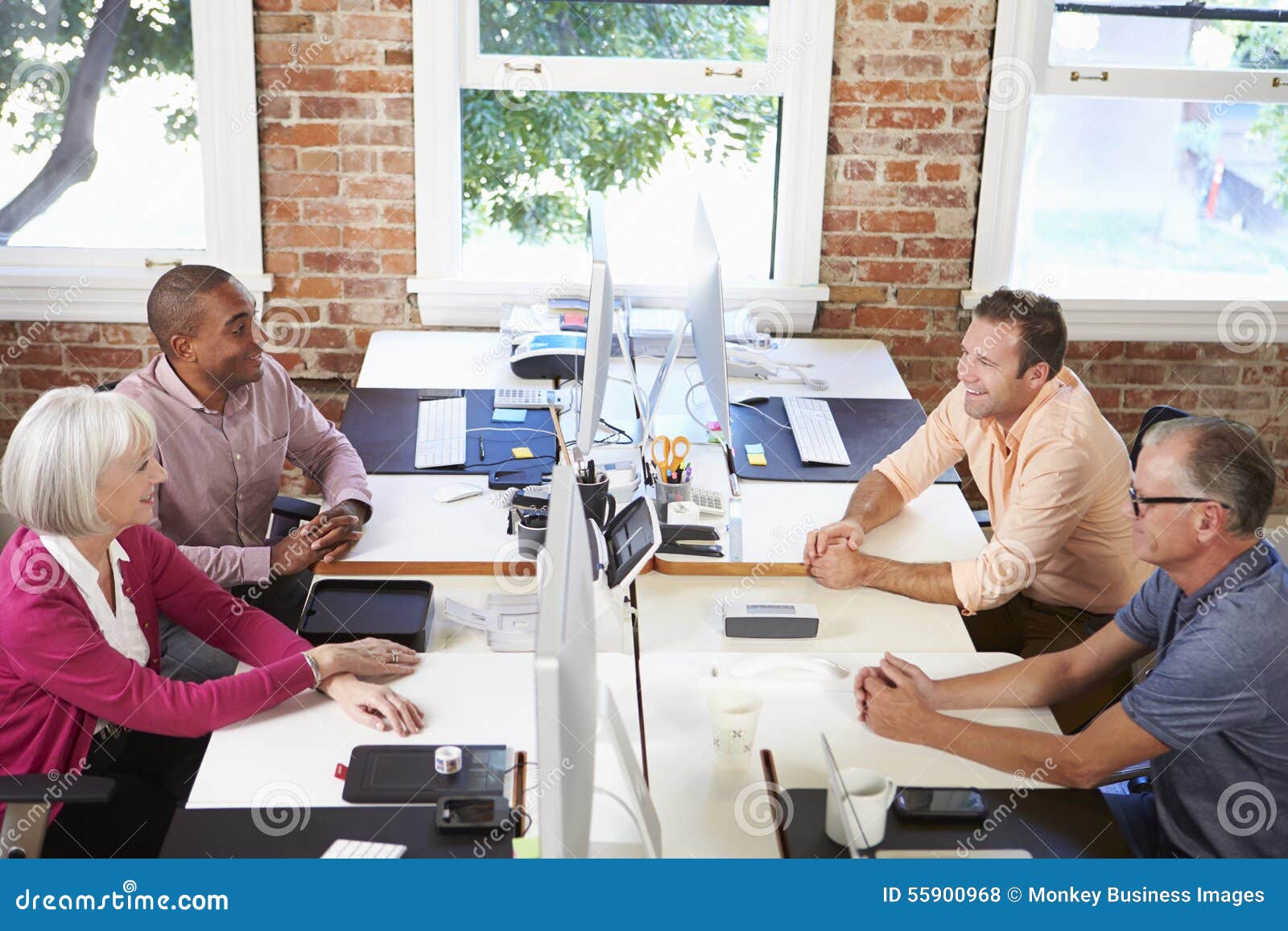 Group of Workers at Desks in Modern Design Office Stock Photo - Image ...