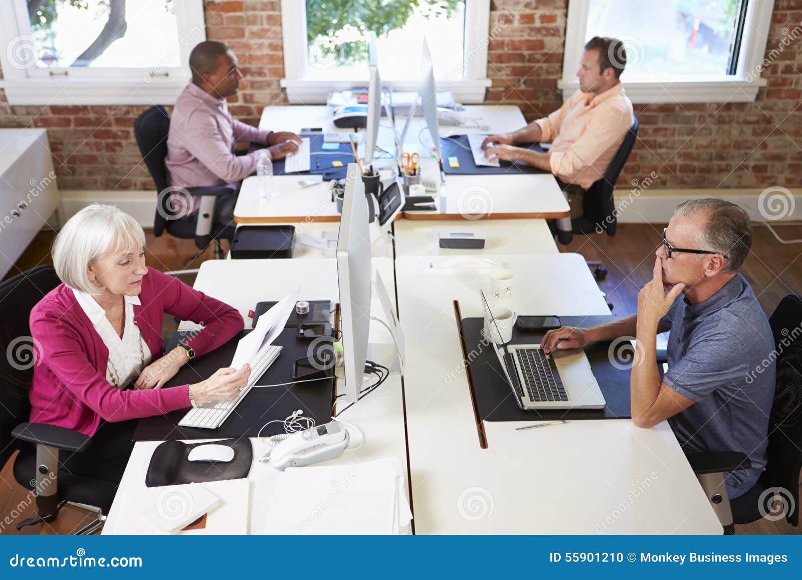 Group of Workers at Desks in Modern Design Office Stock Photo - Image ...