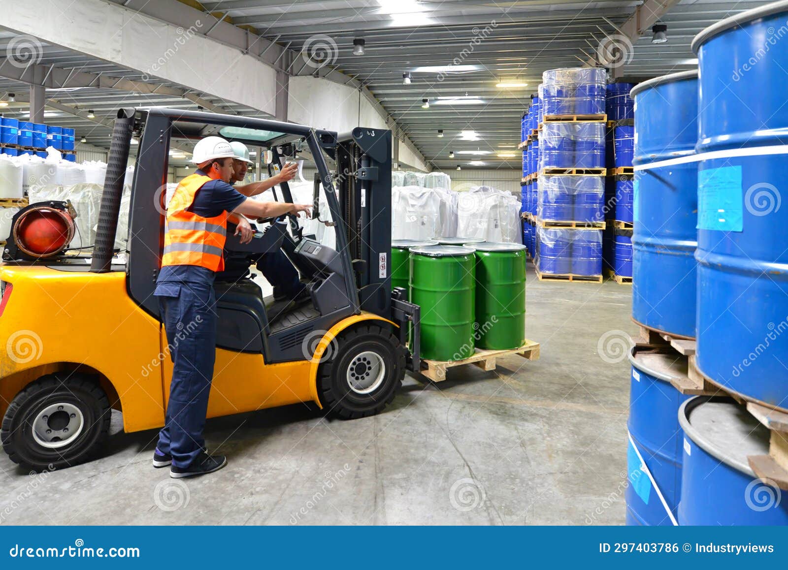Group of Workers in the Logistics Industry Work in a Warehouse with ...