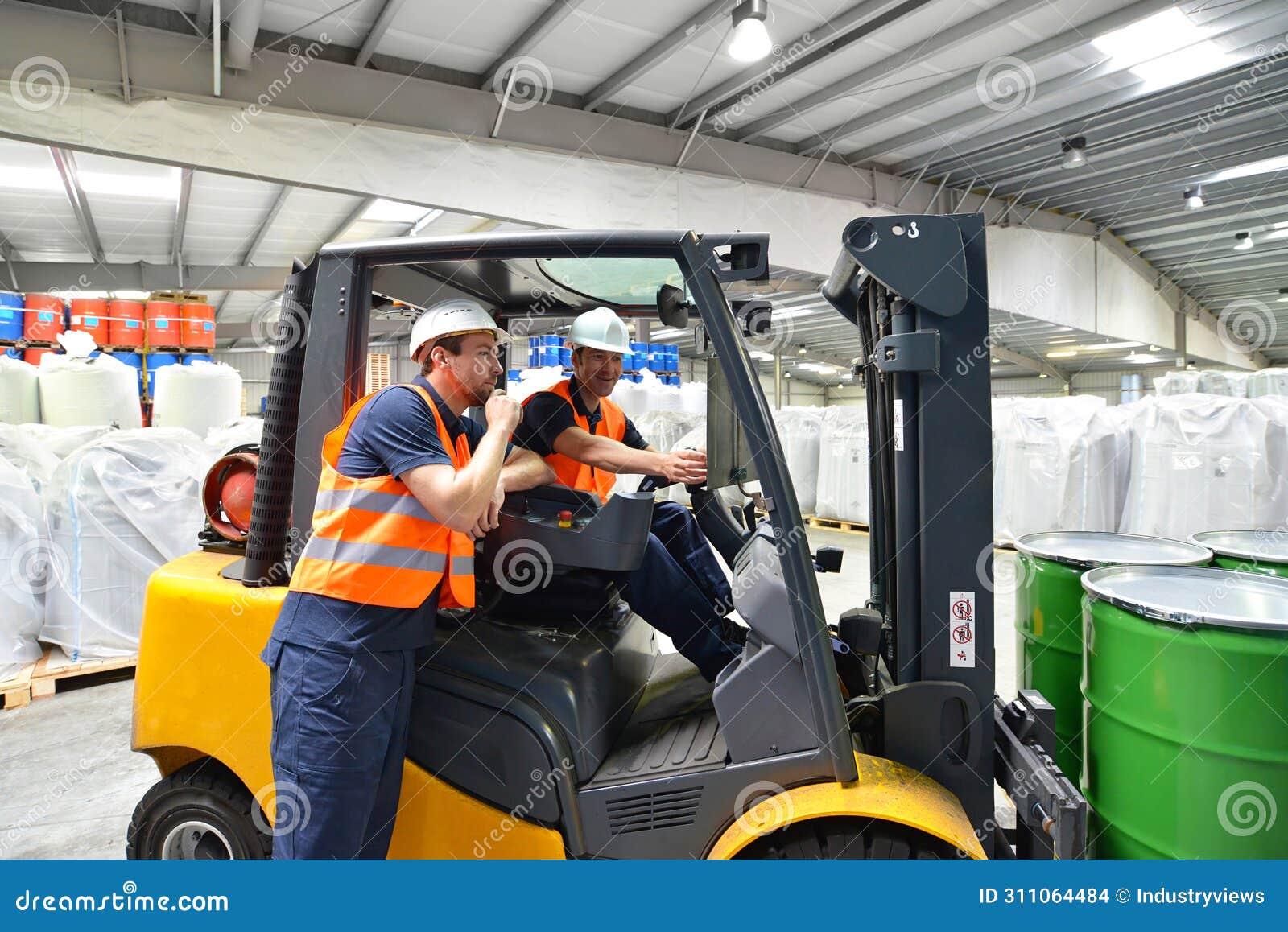 Group of Workers in the Logistics Industry Work in a Warehouse with ...