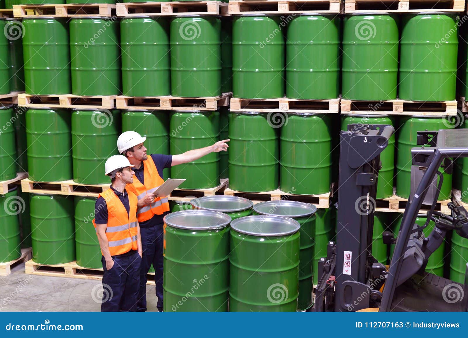 Group of Workers in the Logistics Industry Work in a Warehouse W Stock ...