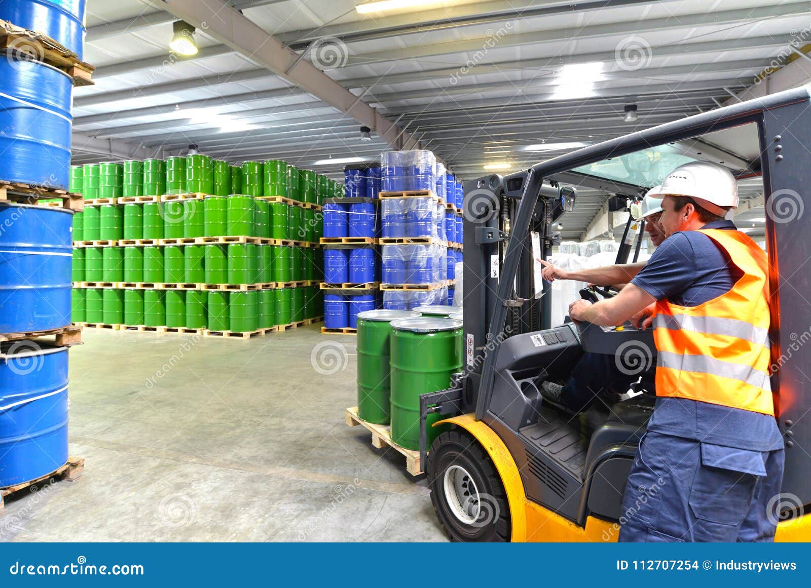 Group of Workers in the Logistics Industry Work in a Warehouse W Stock ...