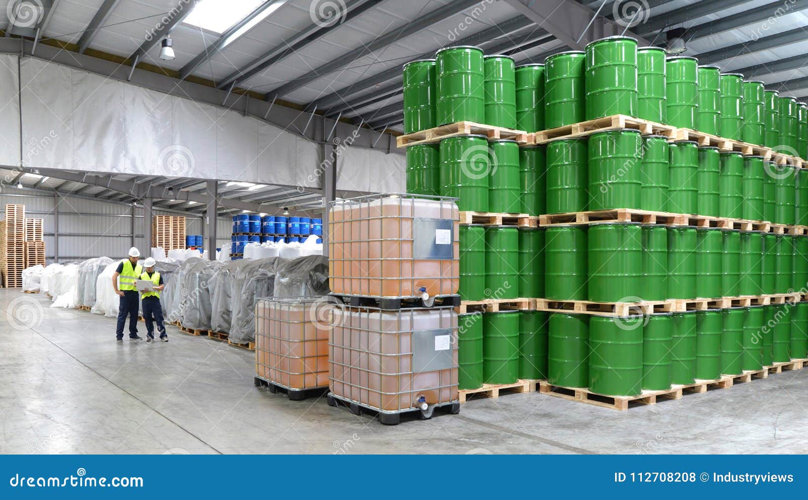 Group of Workers in the Logistics Industry Work in a Warehouse W Stock ...