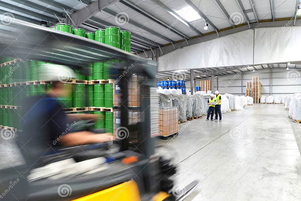 Group of Workers in the Logistics Industry Work in a Warehouse W Stock ...