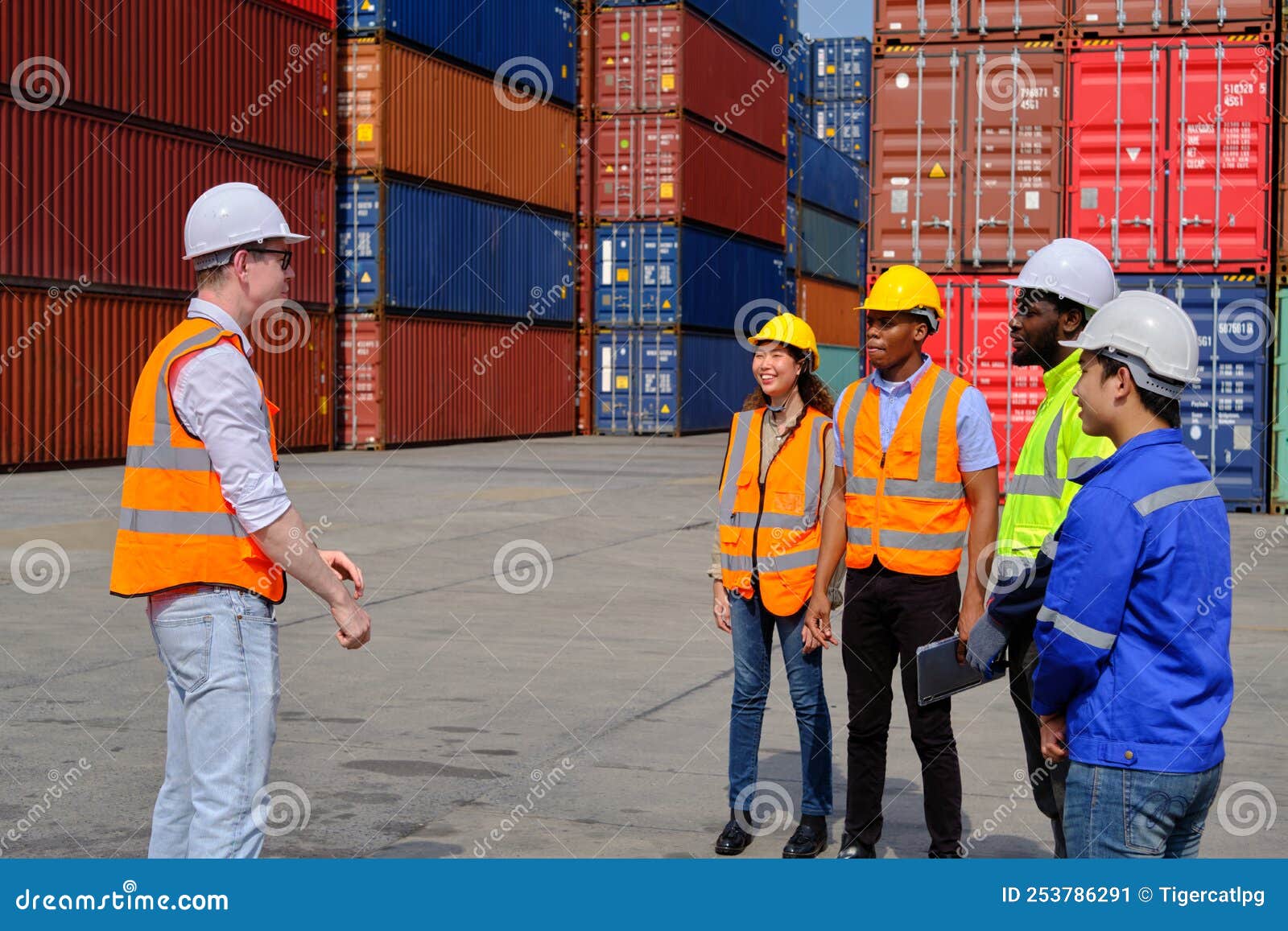 Group of Workers Teamwork at Logistics Dock with Many Stacks of ...