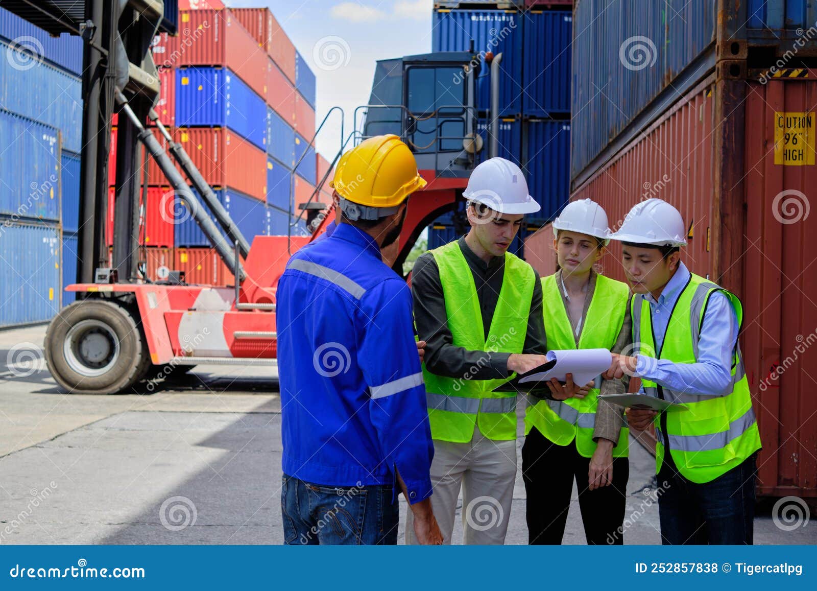 Group of Workers Teamwork at Logistics Terminal with Many Stacks of ...