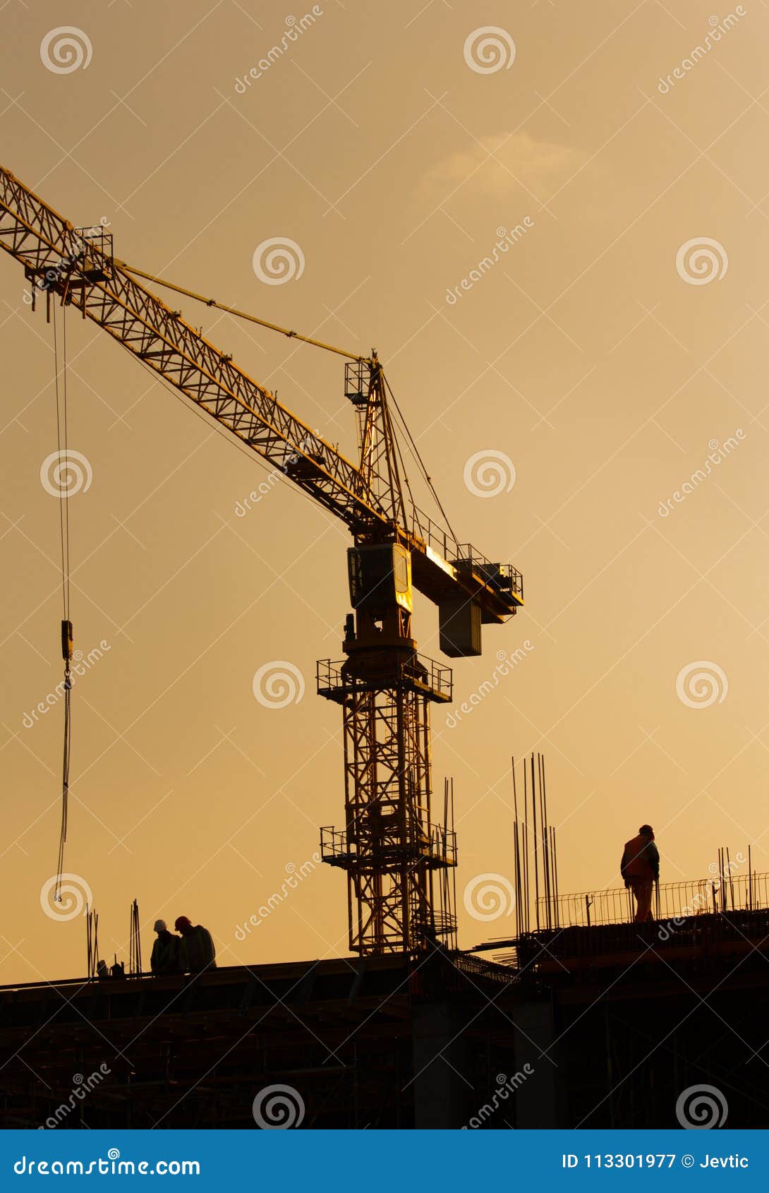 Construction Workers on Building Site at Sunset Editorial Photography ...