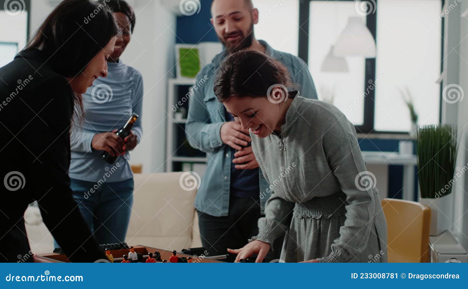 Group of Workmates Playing Game on Foosball Table Stock Video - Video ...