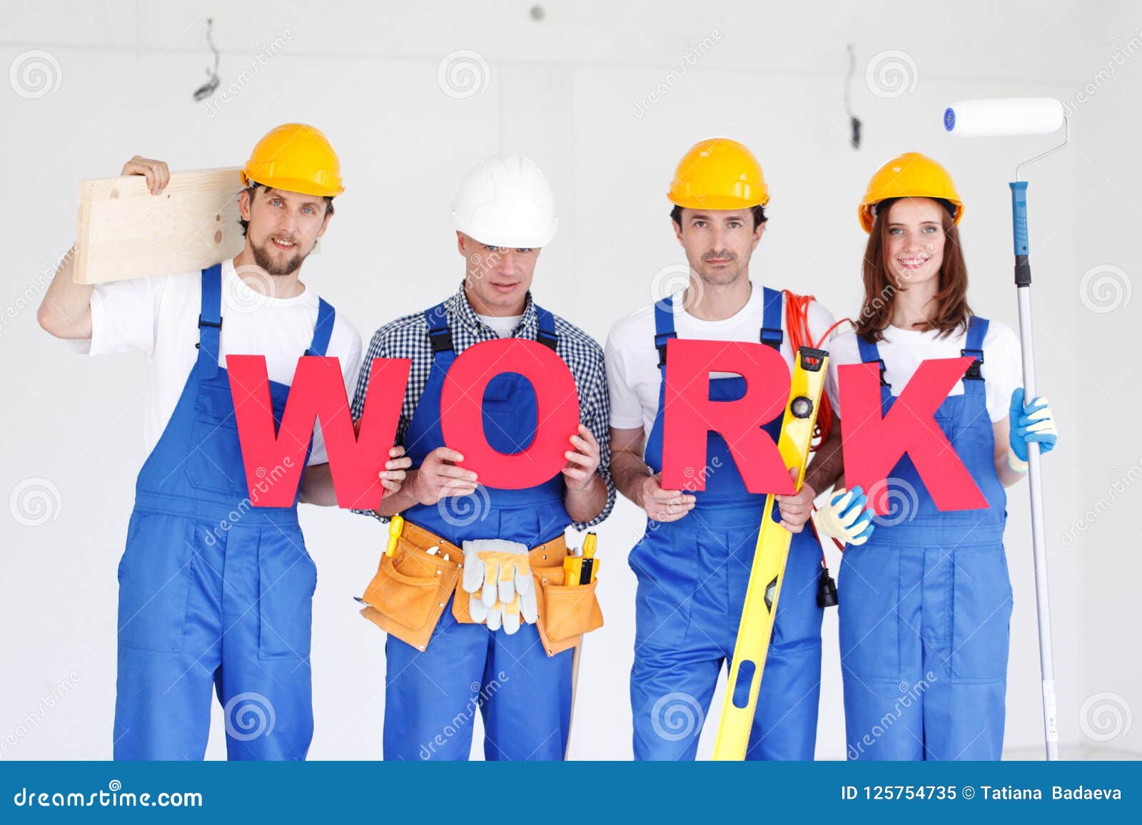 Workmen with word WORK stock image. Image of holding - 125754735