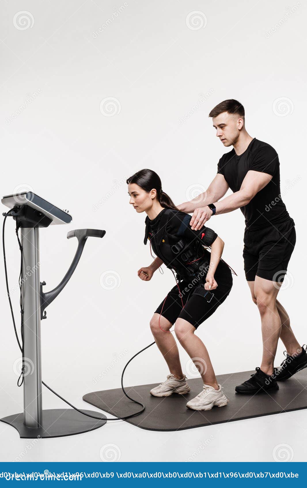 Group Workout Training in EMS Suit, Which Applies Electrical Impulses ...