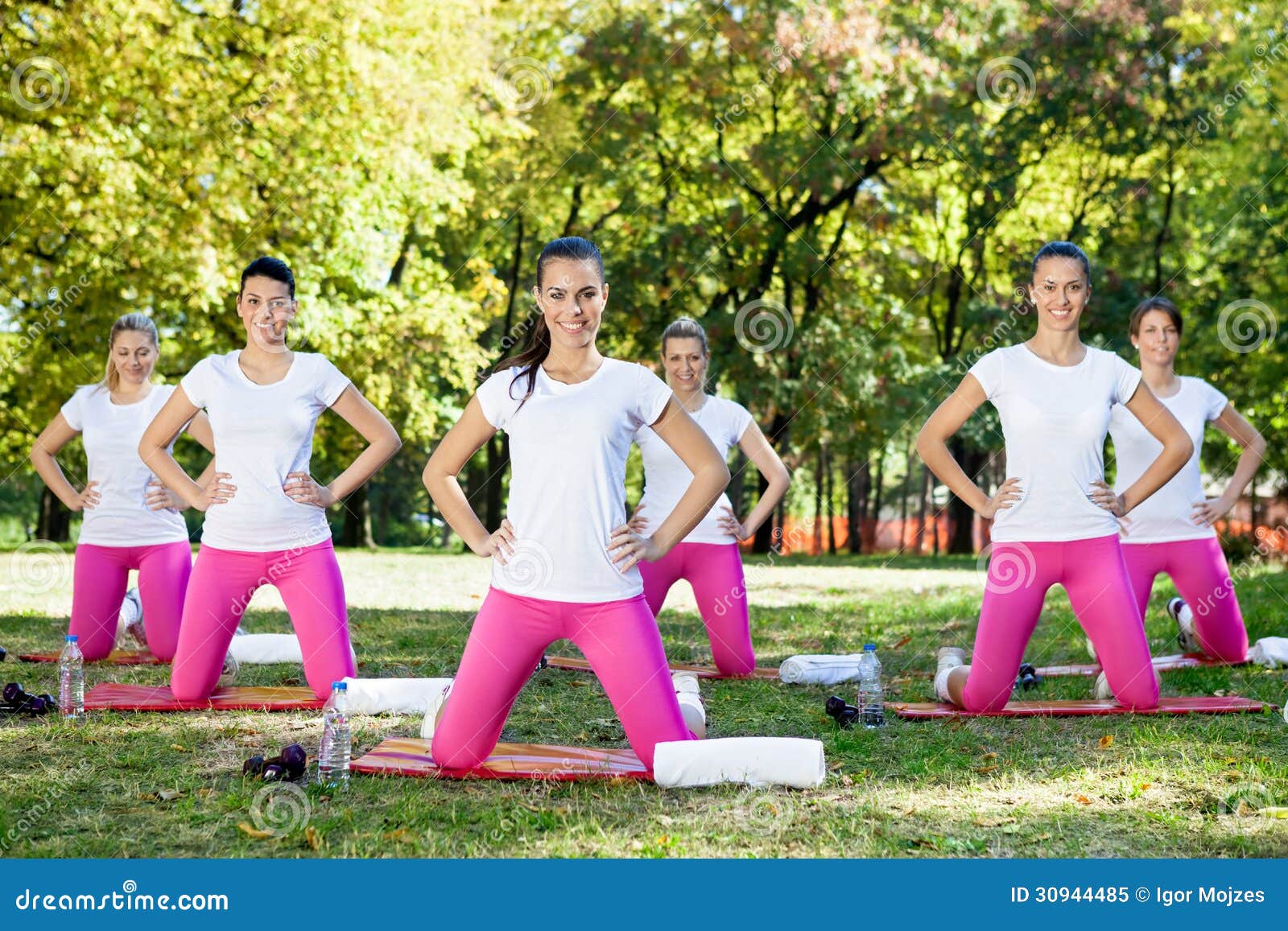 A group workout stock image. Image of pink, smiling, fitness - 30944485