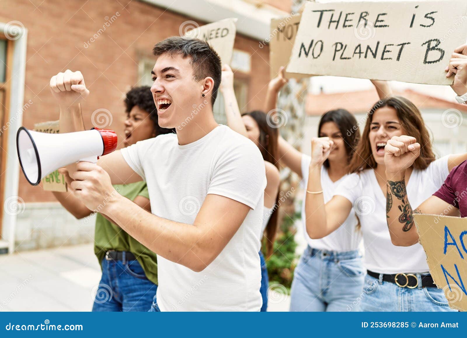 Group of Young Activists People Protesting Holding Banner and Using ...