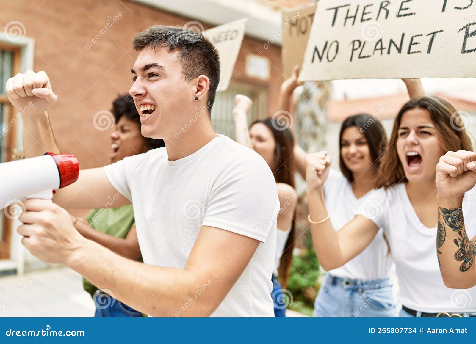 Group of Young Activists People Protesting Holding Banner and Using ...