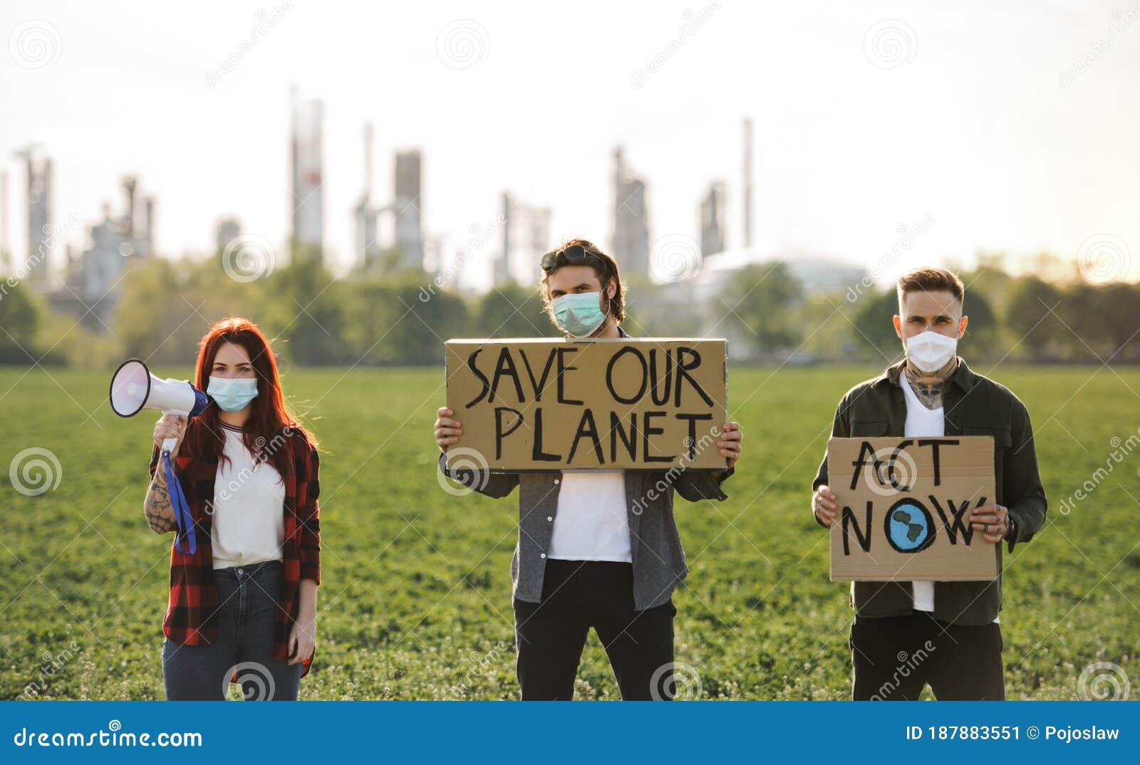 Group of Young Activists with Placards Standing Outdoors by Oil ...