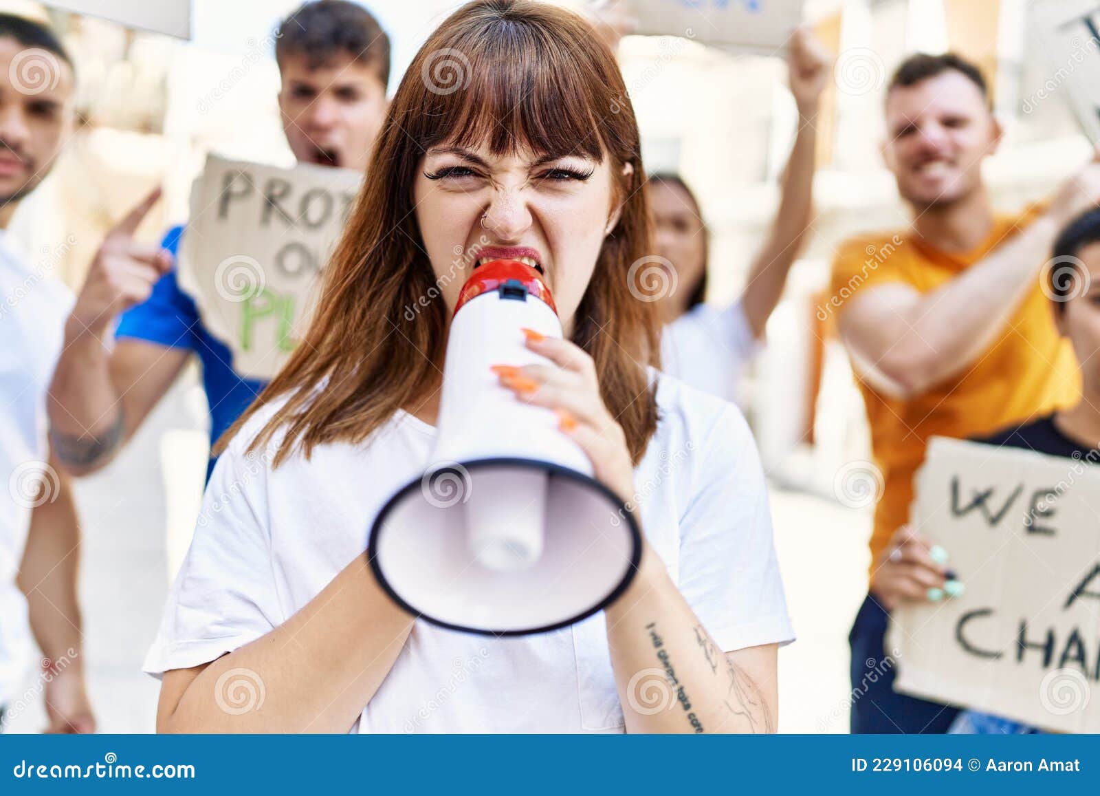 Group of Young Activists Protesting Holding Banner and Using Megaphone ...